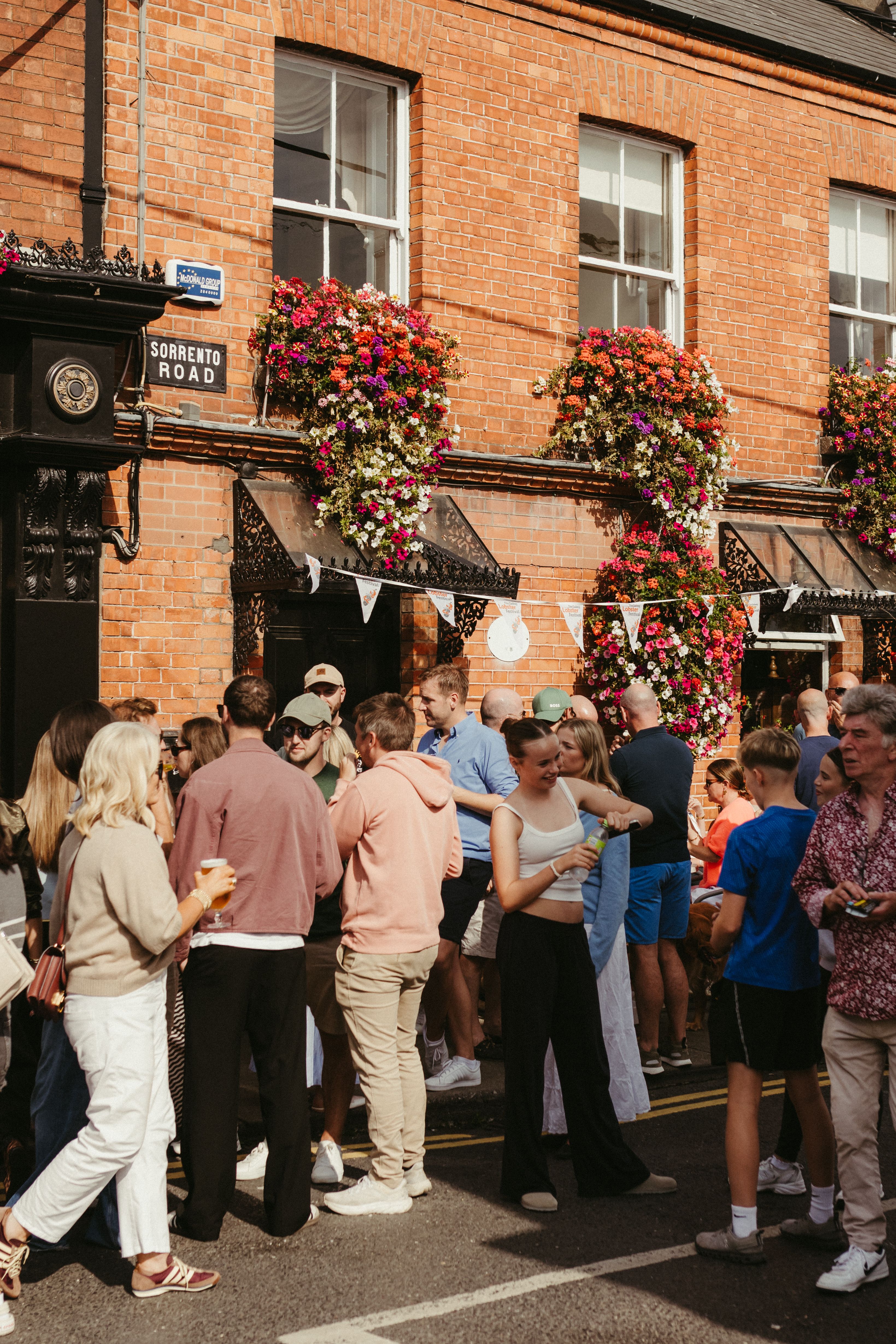 Vibrant Street Gathering on Sorrento Road, Dublin · Free Stock Photo