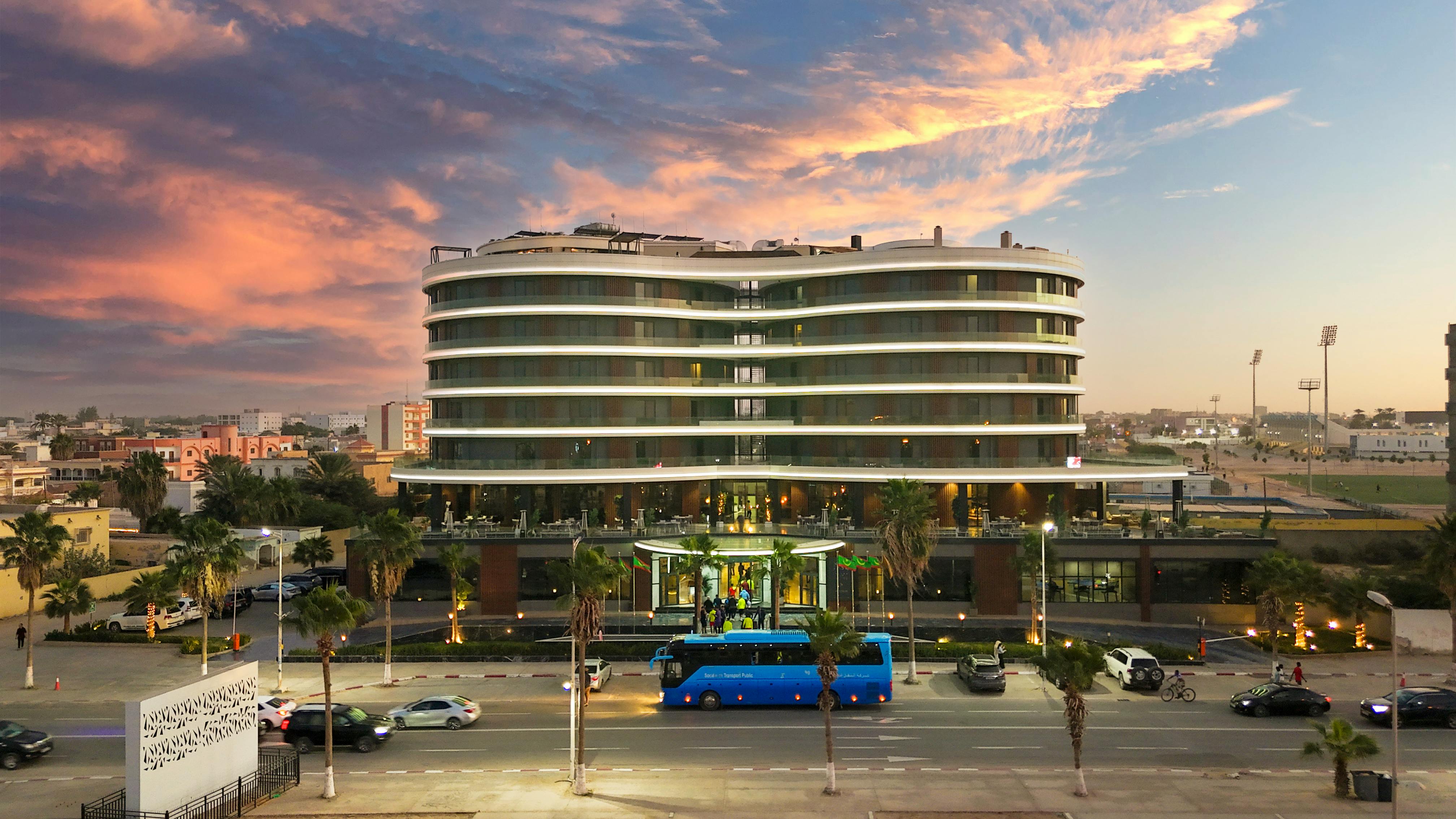 Modern Hotel Exterior at Sunset in Nouakchott · Free Stock Photo