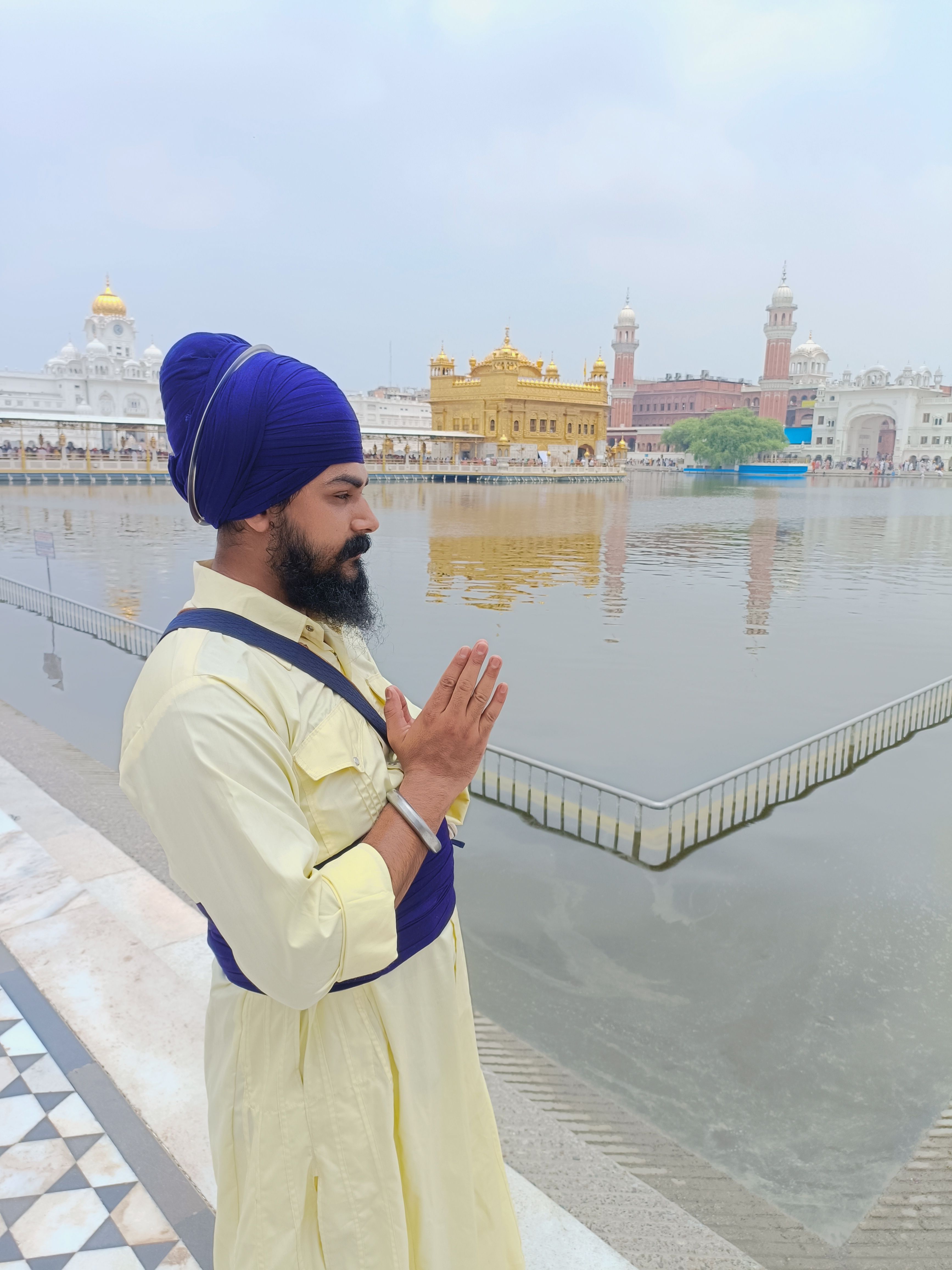 Sikh Man in Prayer at Golden Temple, Amritsar · Free Stock Photo