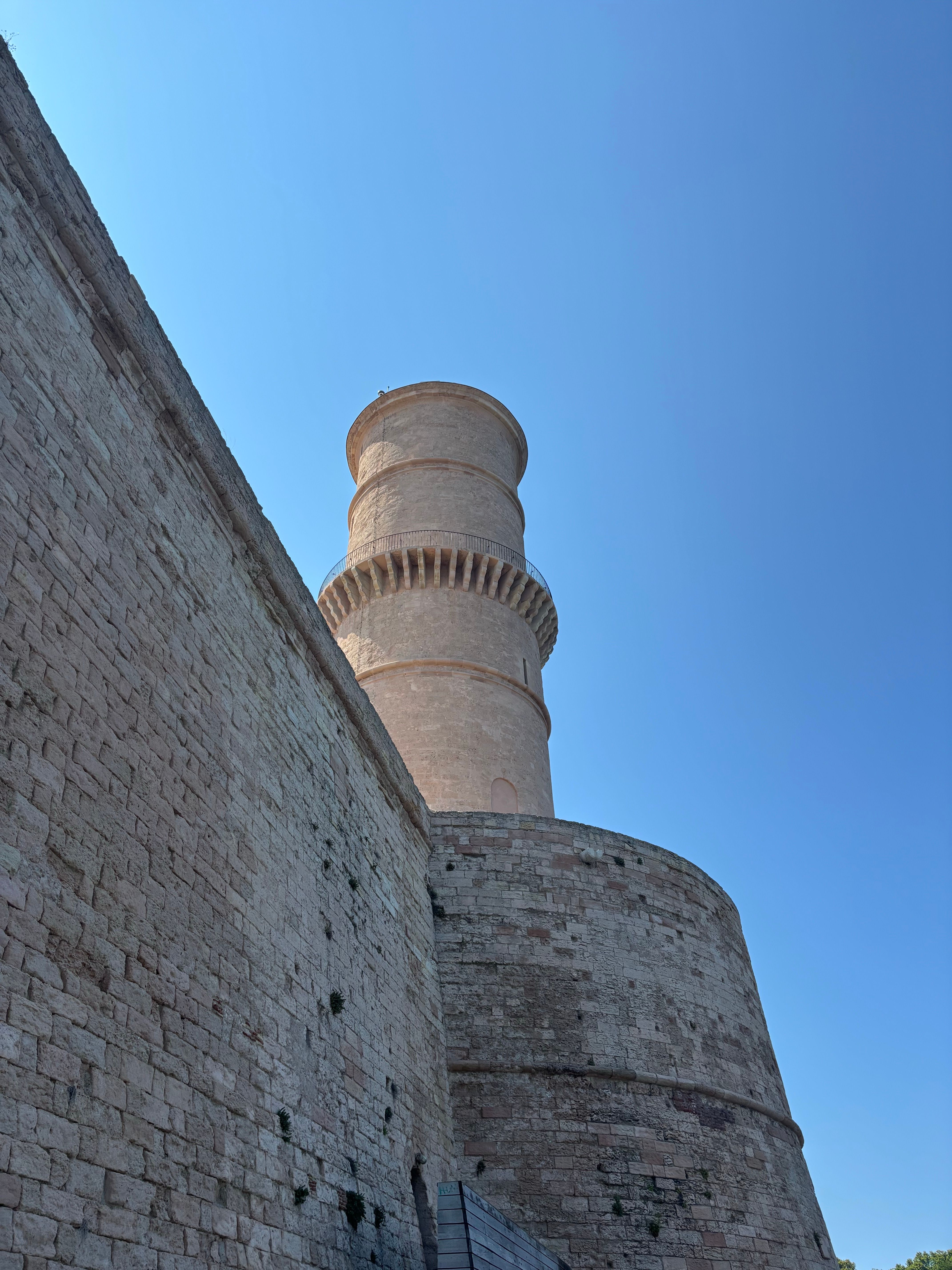 Historic Stone Tower Against Clear Blue Sky · Free Stock Photo