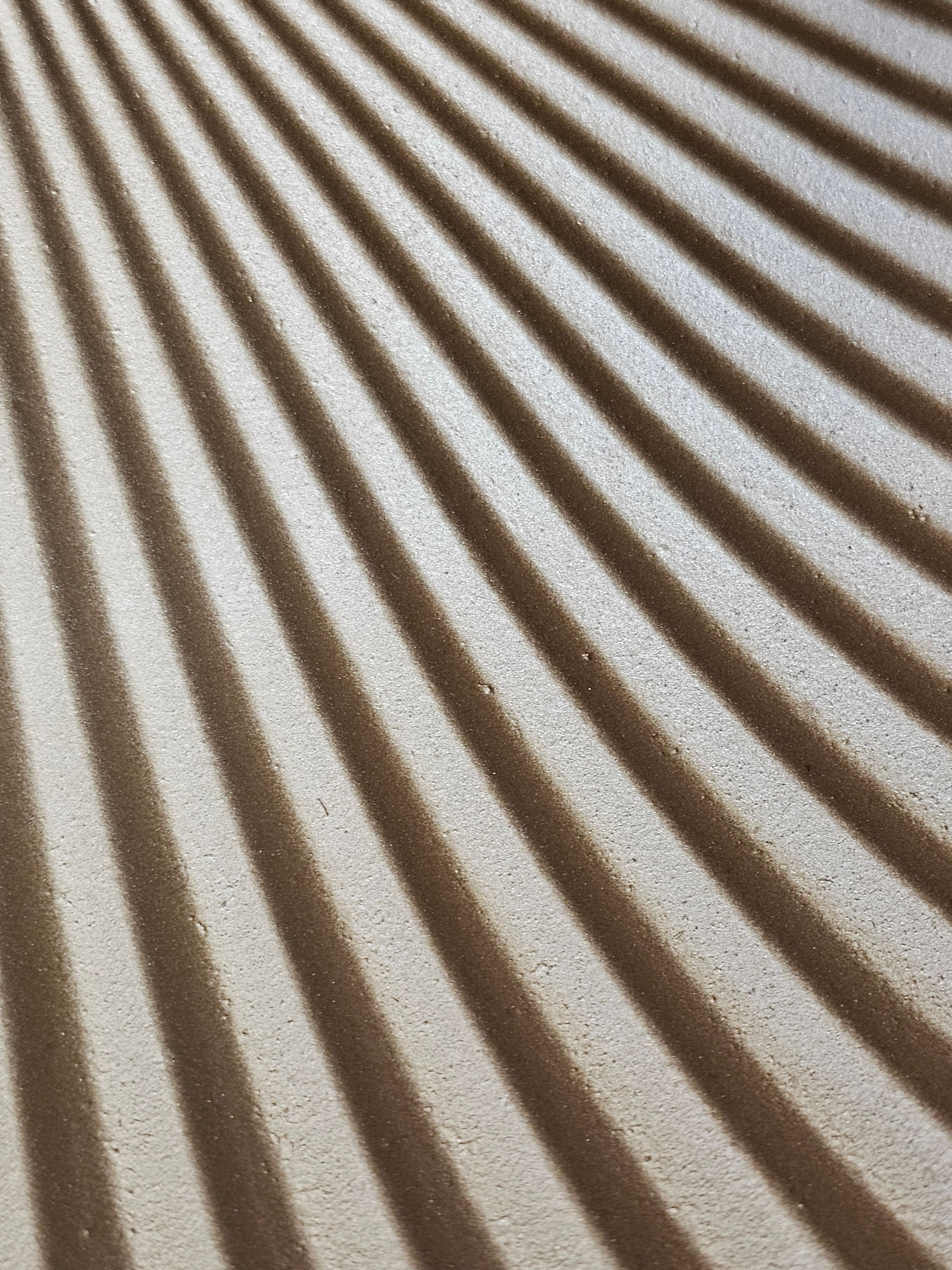 Minimalist Sand Ripple Pattern Close-up · Free Stock Photo
