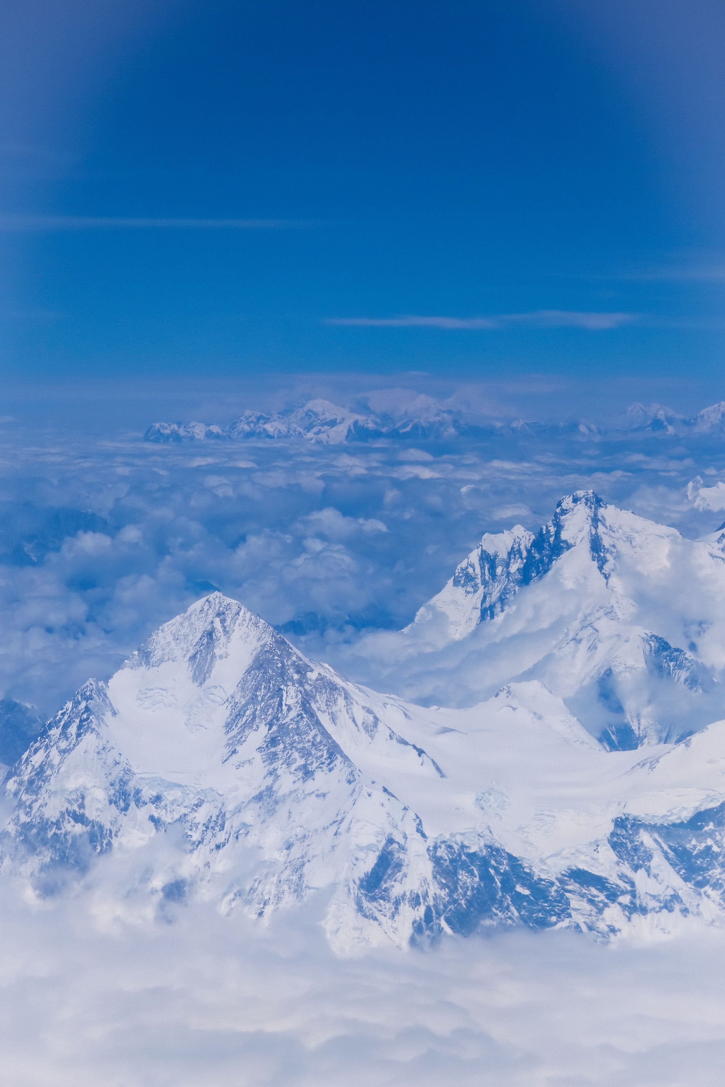 Stunning Aerial View of Snow-Capped Himalayan Peaks · Free Stock Photo