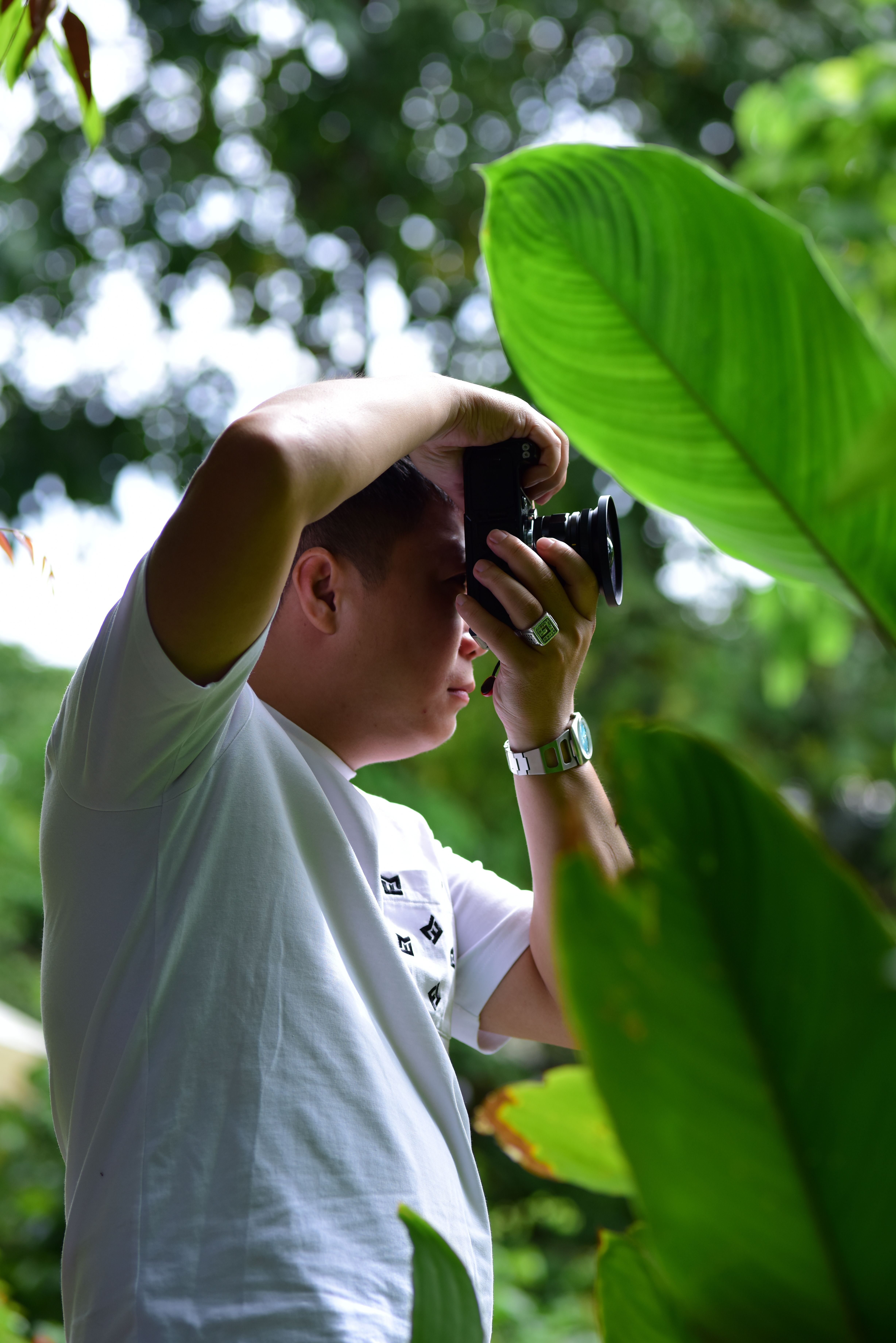 Photographer Capturing Nature Outdoors · Free Stock Photo
