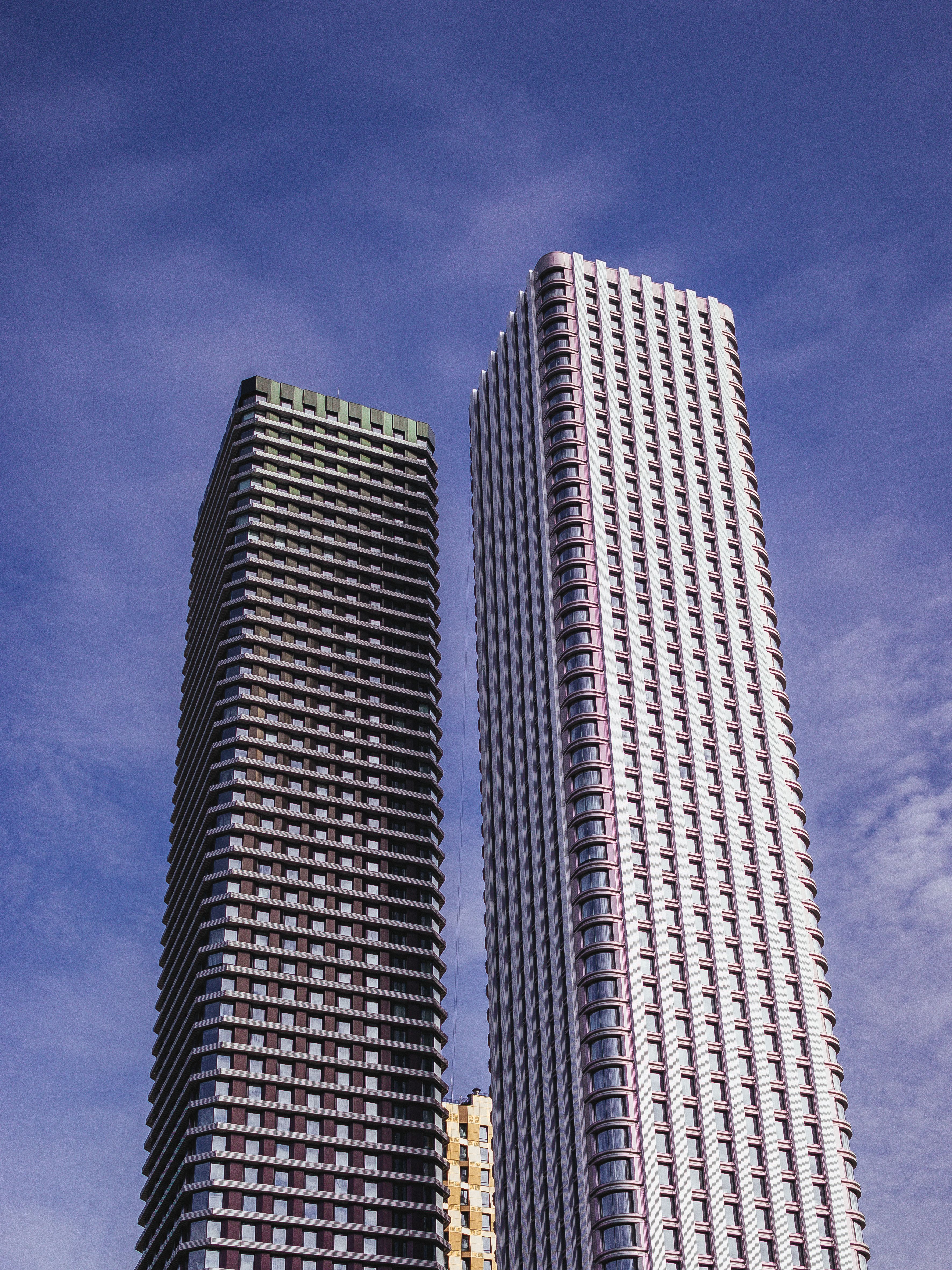 Tall Modern Skyscrapers Against Blue Sky · Free Stock Photo