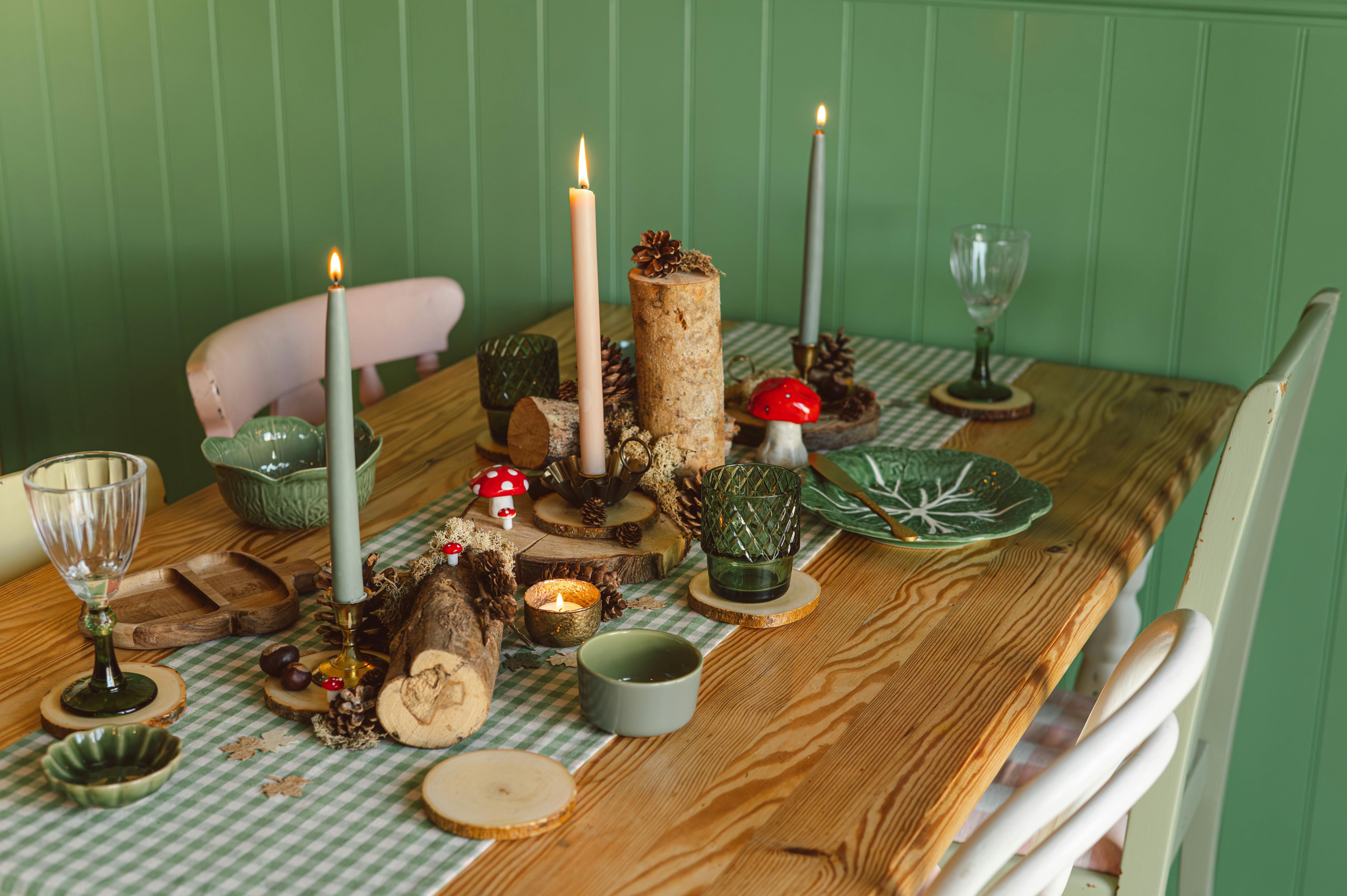 Cozy Autumn Woodland Table Setting with Candles · Free Stock Photo