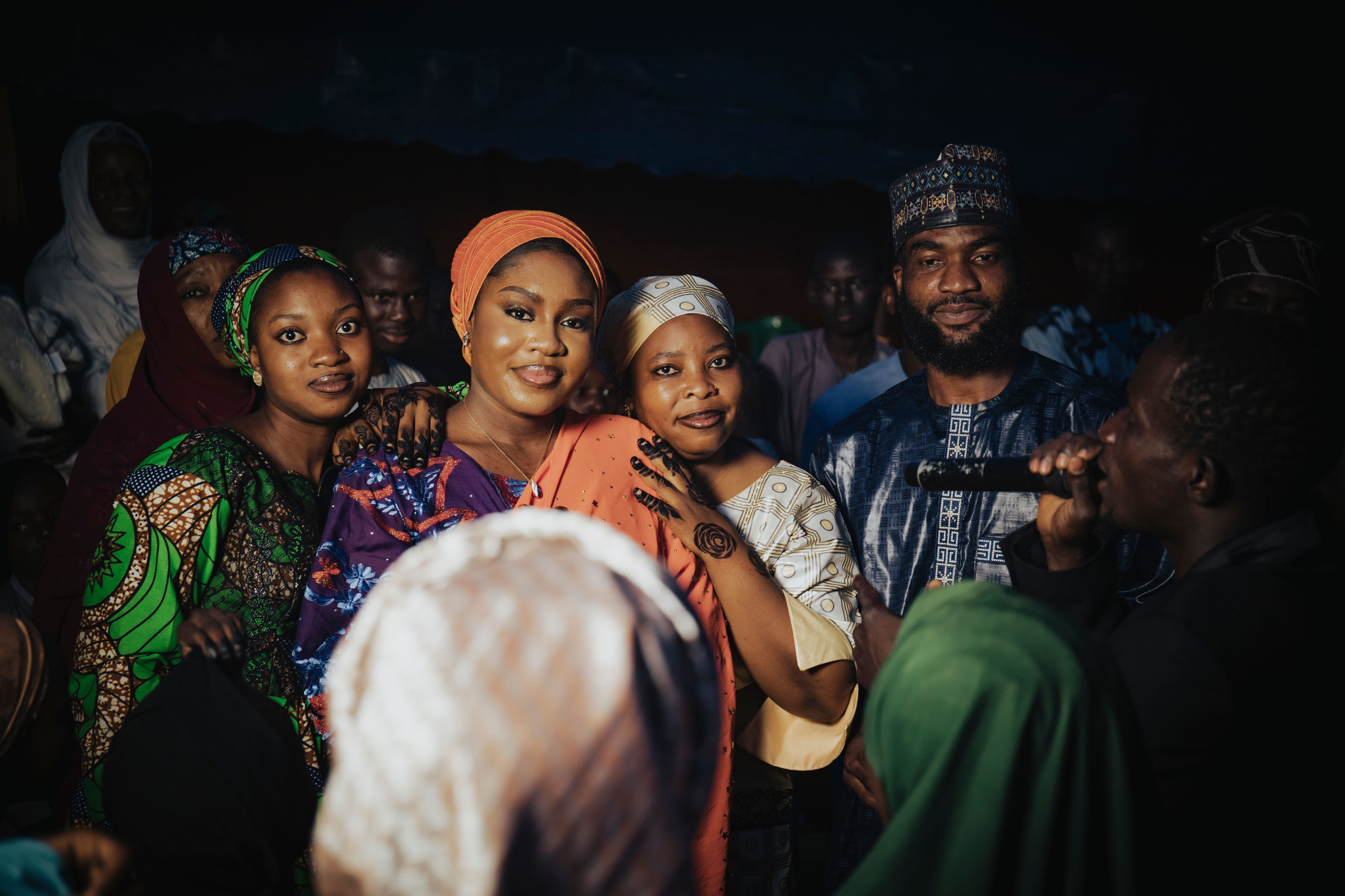 Vibrant Cultural Gathering with Traditional Clothing · Free Stock Photo