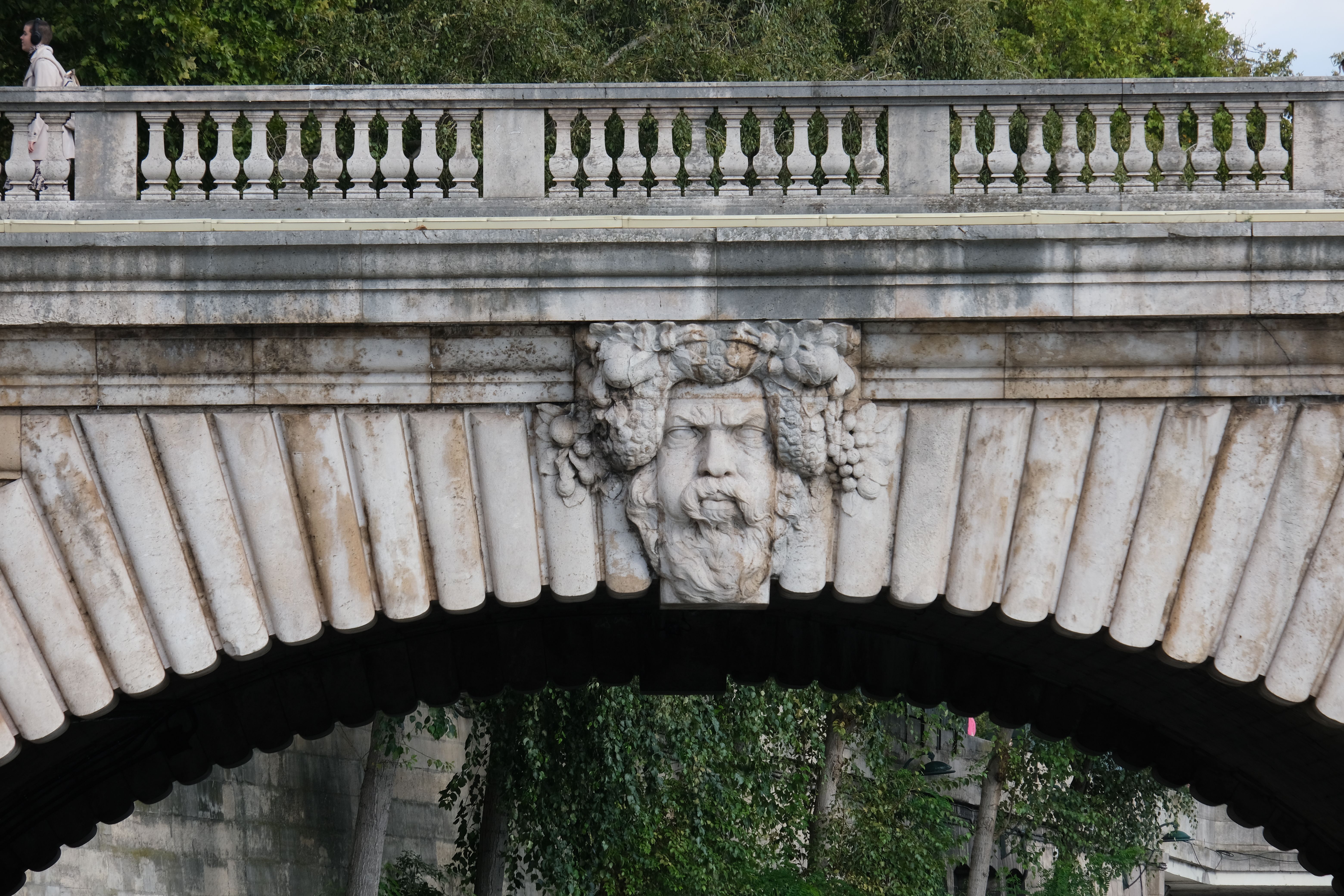 Stone Bridge with Artistic Face Relief in Park · Free Stock Photo