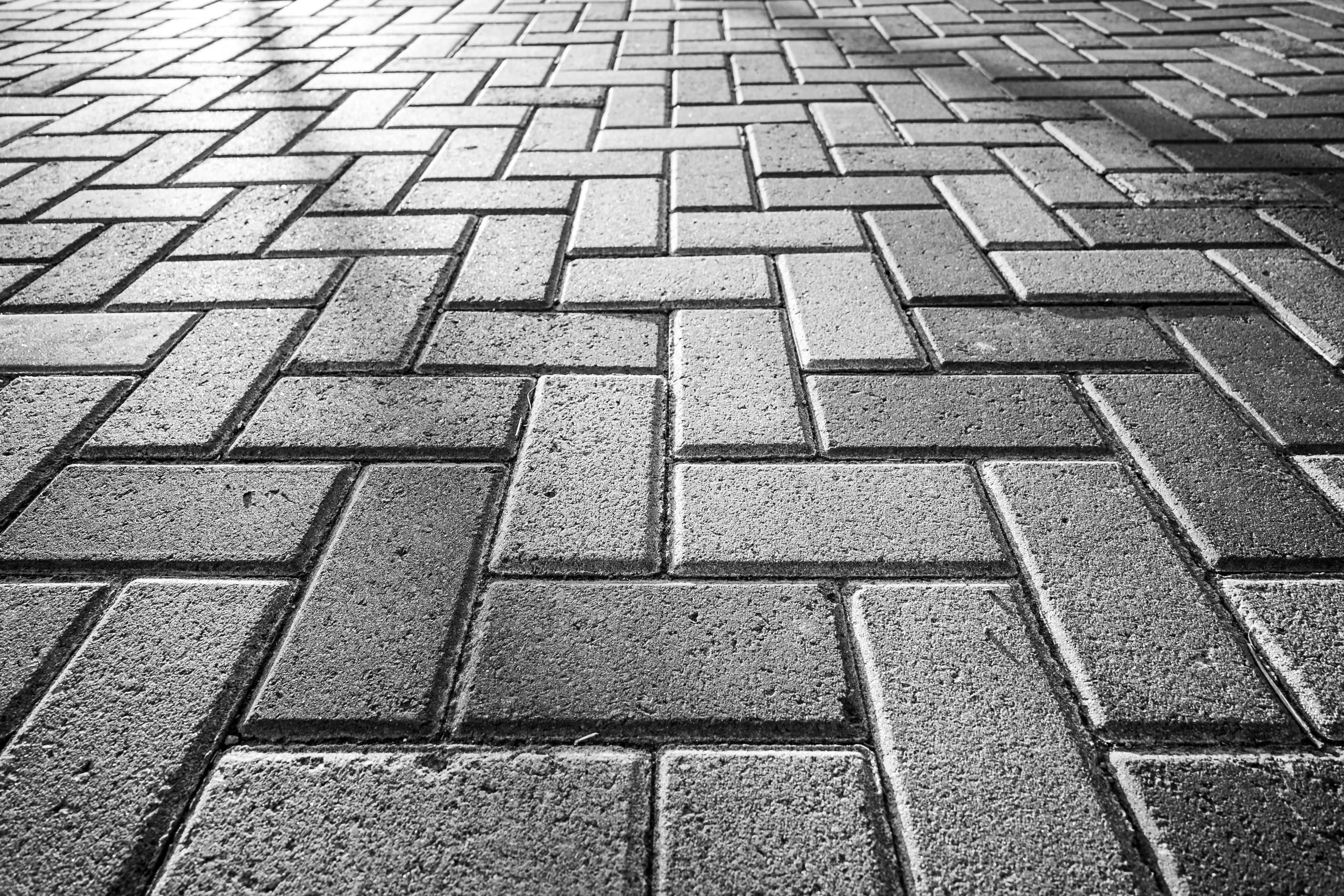Monochrome Brick Pattern Pavement Texture · Free Stock Photo