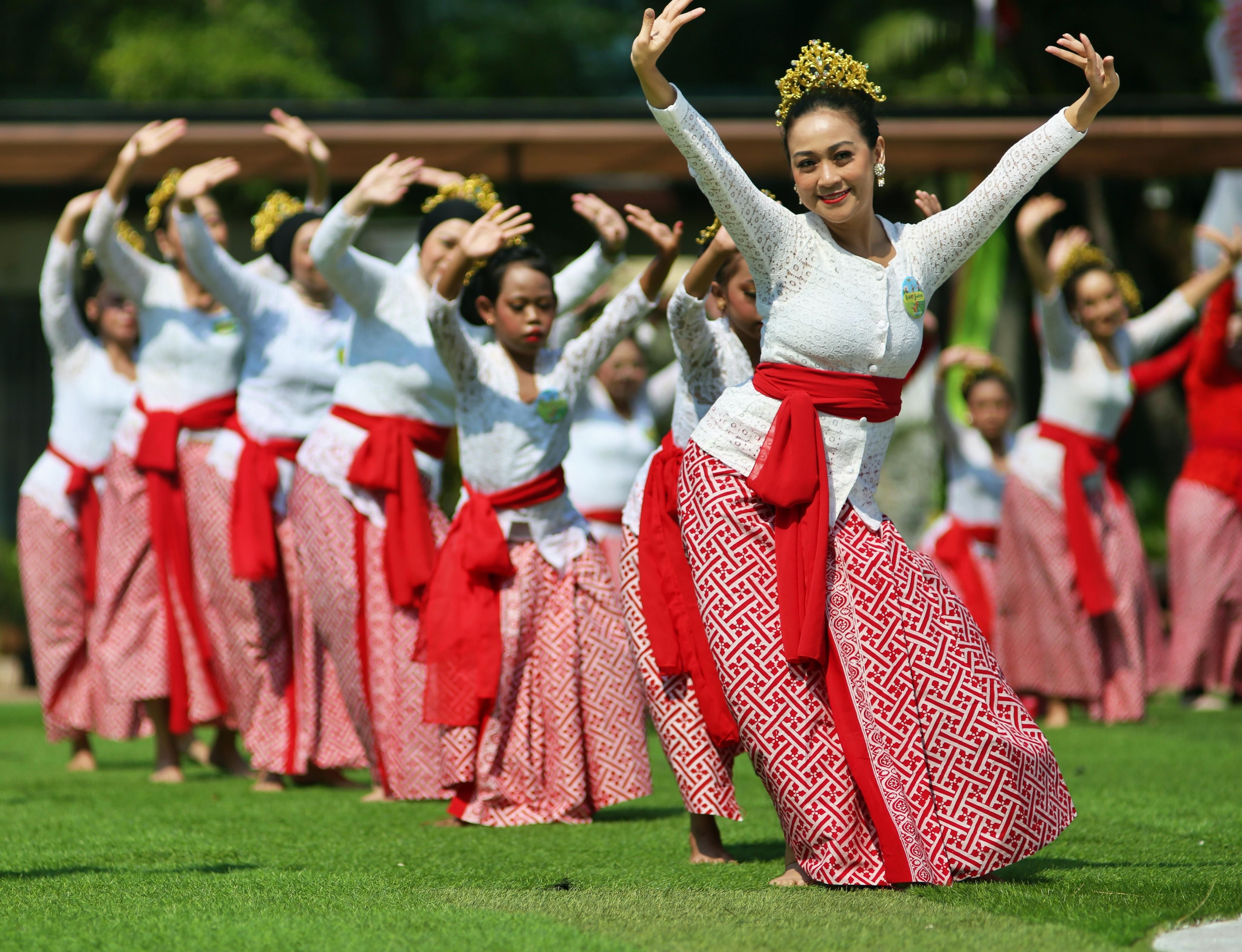 Traditional Dance Performance in Vibrant Costumes · Free Stock Photo