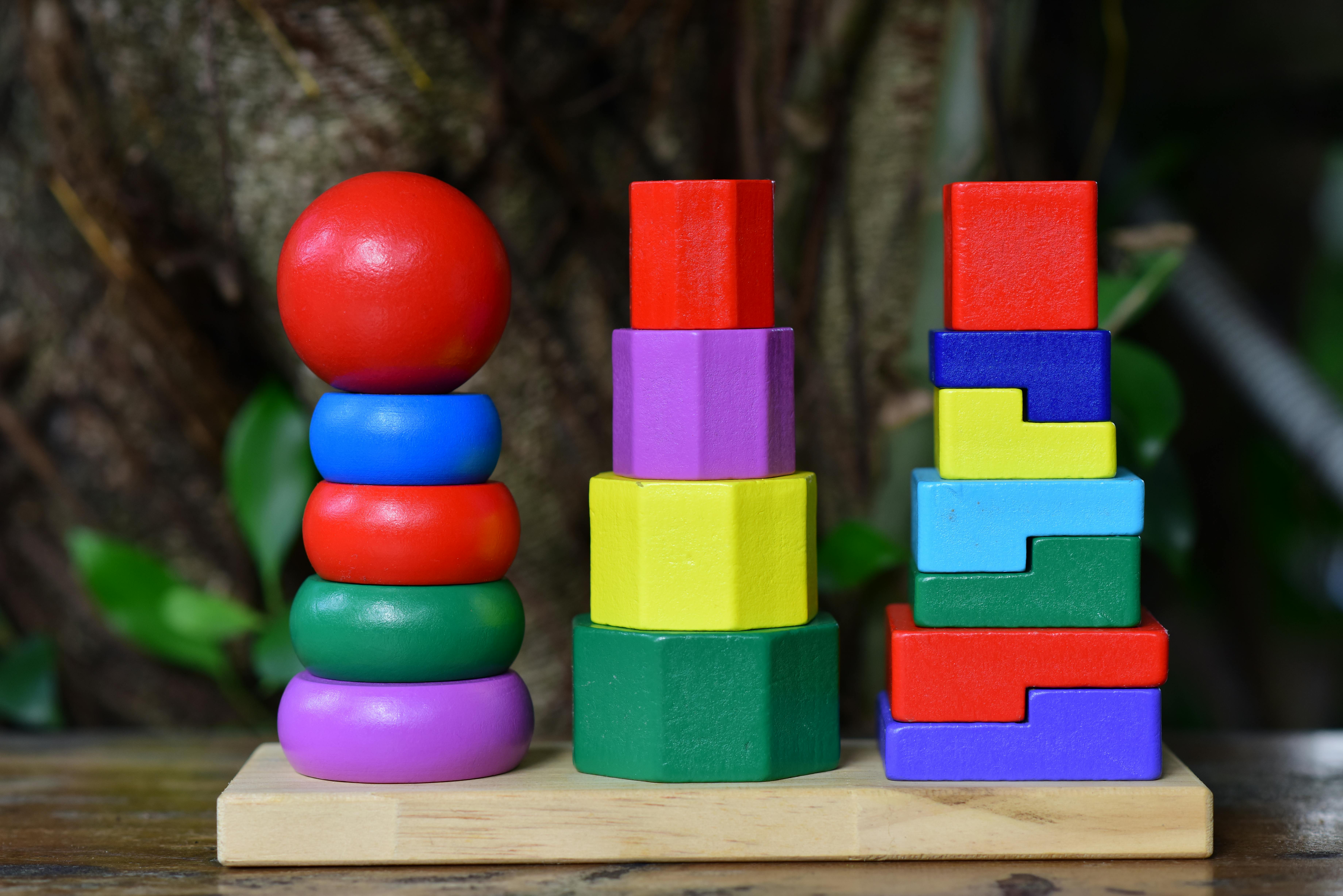 Colorful Wooden Stacking Toy Collection · Free Stock Photo