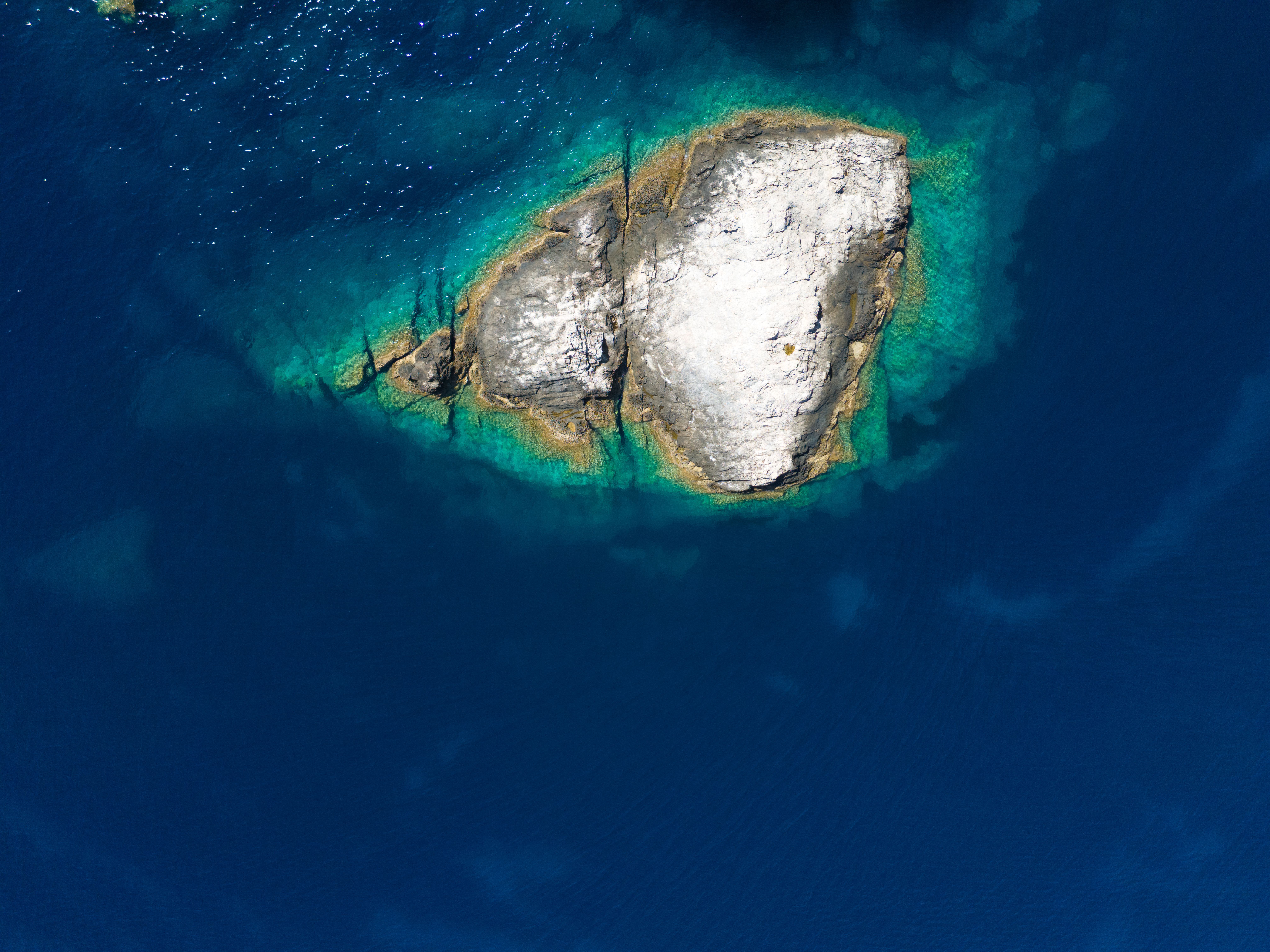 Aerial View of Pristine Greek Island in Azure Sea · Free Stock Photo