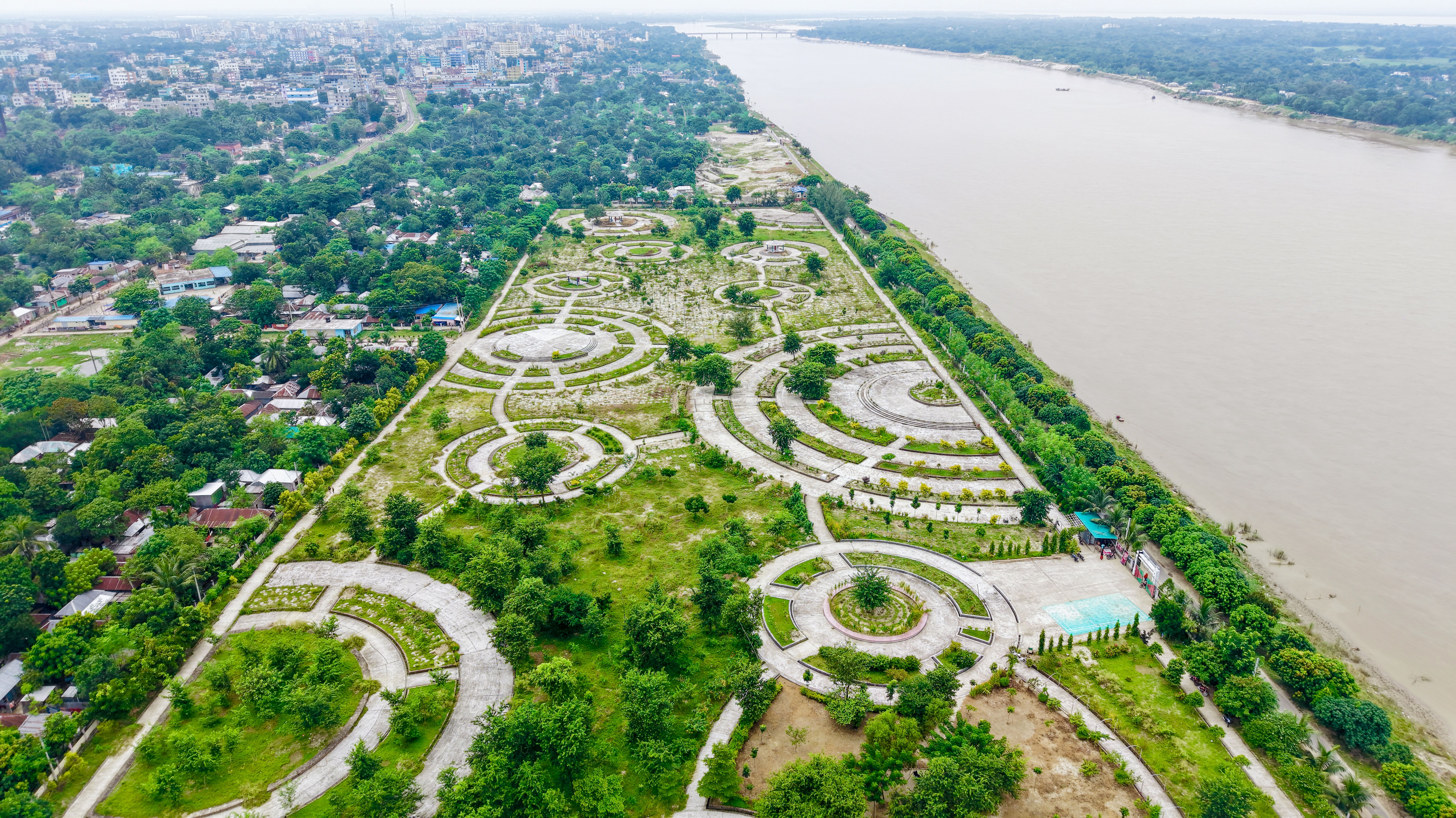 Aerial View of Circular Landscape Park by River · Free Stock Photo
