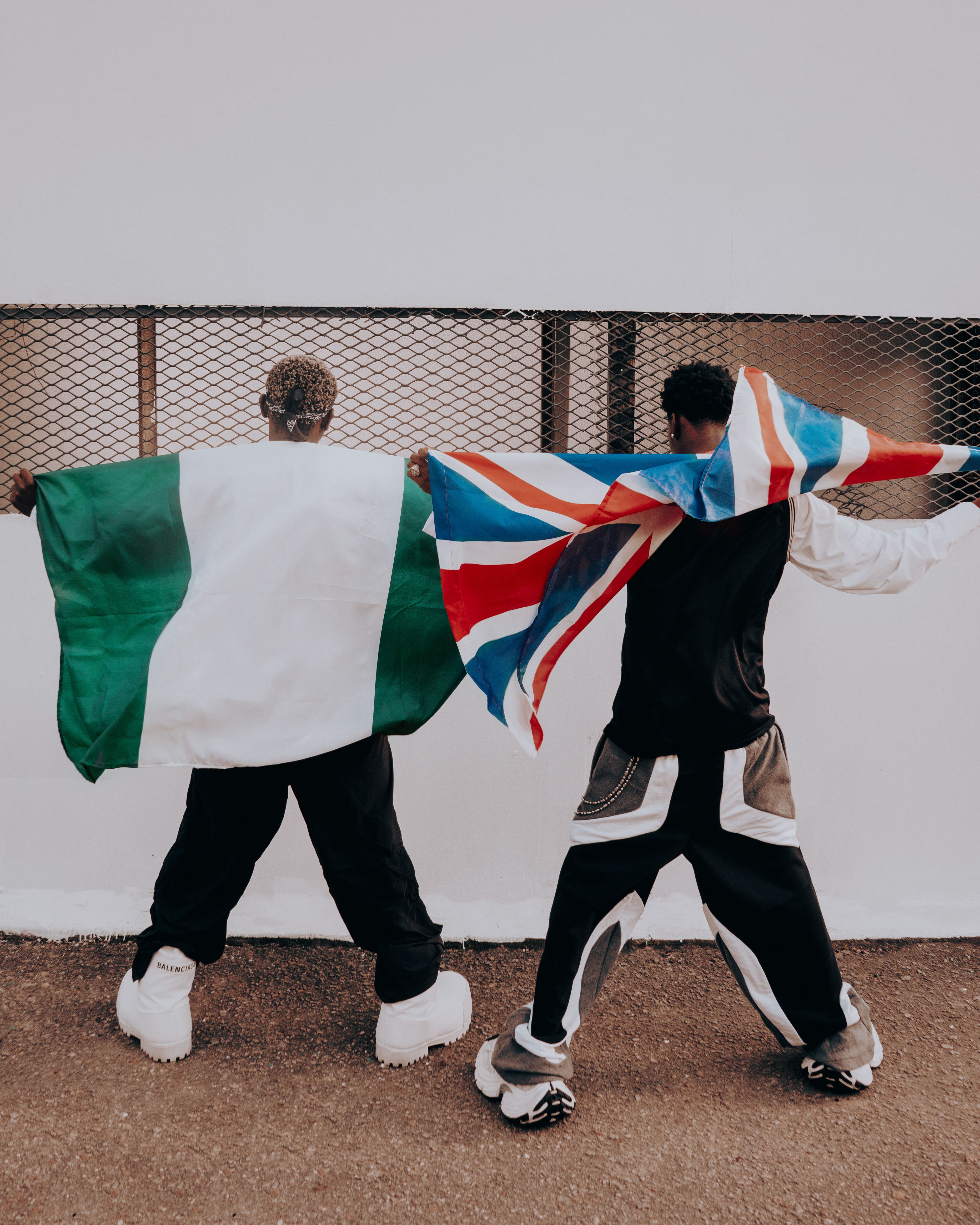Cultural Unity with Nigerian and UK Flags · Free Stock Photo
