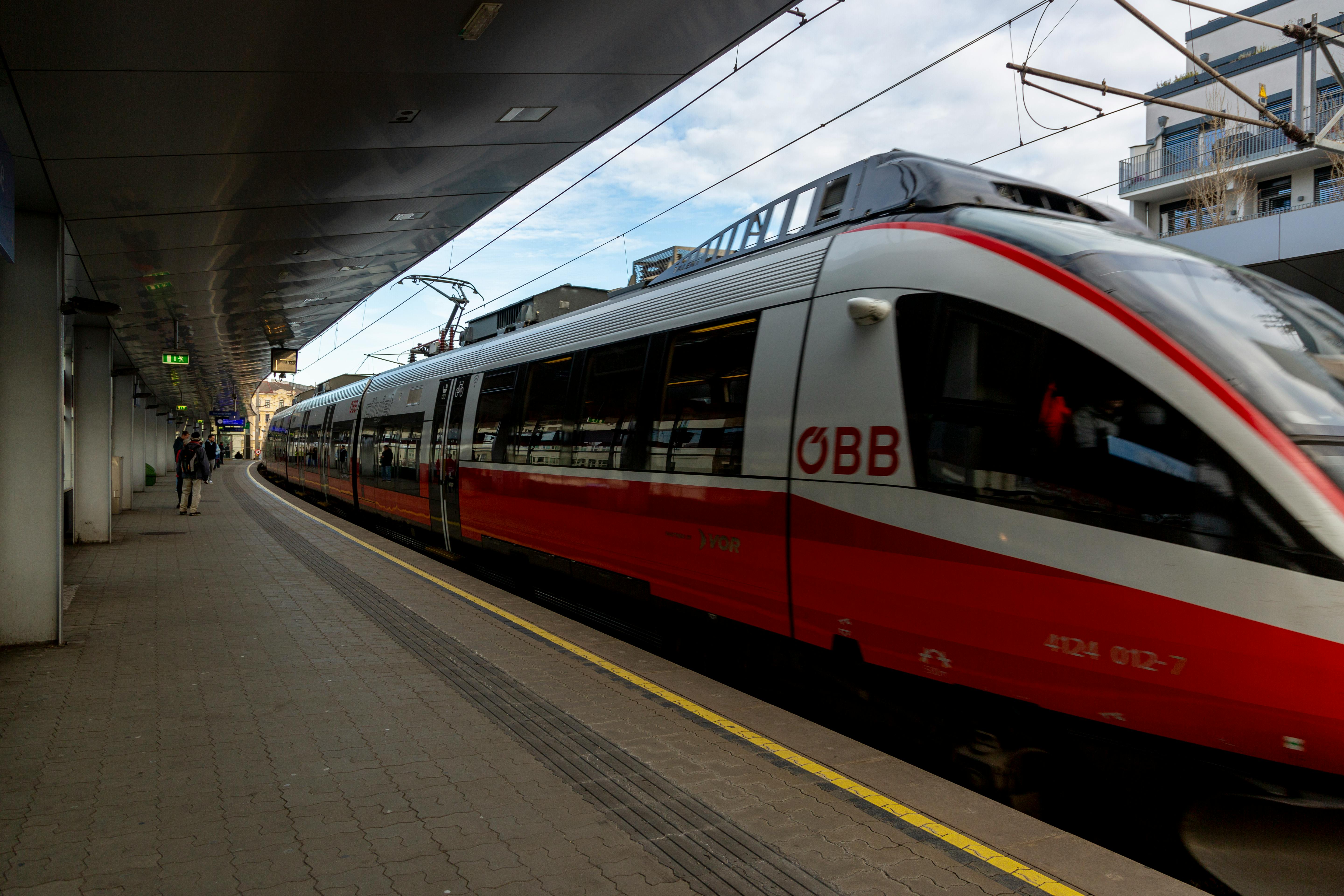 Modern Austrian Train at Station Platform · Free Stock Photo