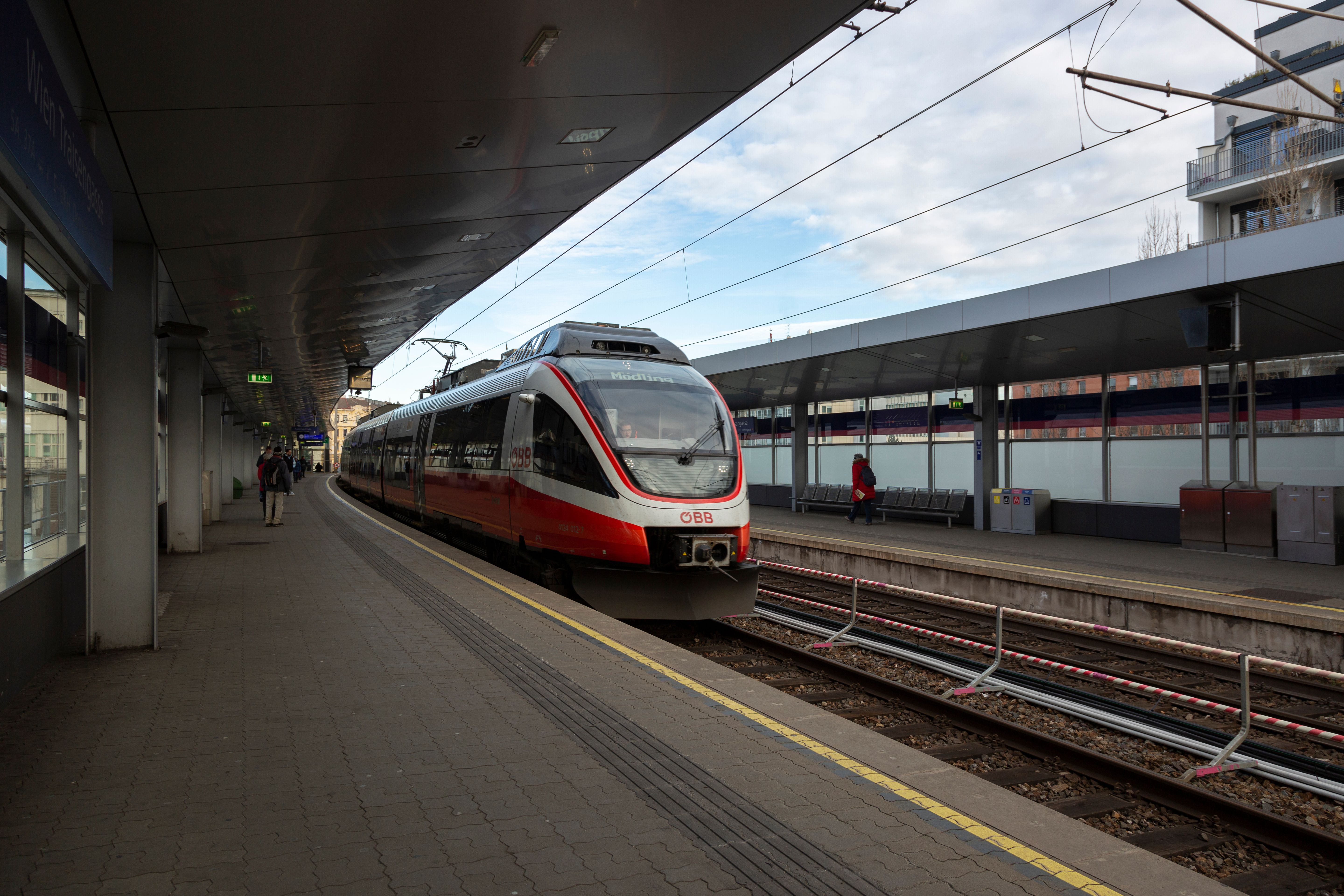 Modern Red Train at Urban Railway Station · Free Stock Photo