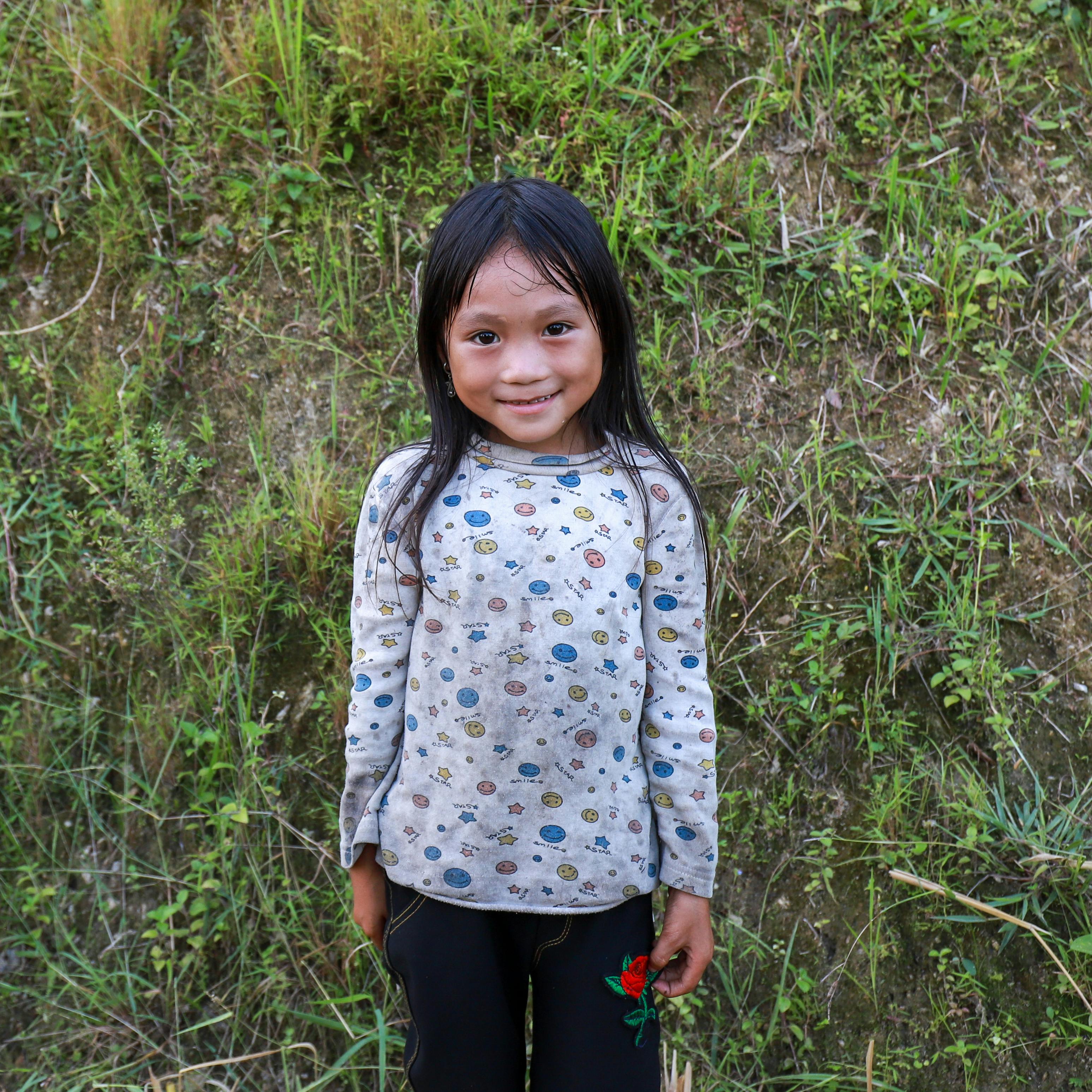 Portrait of Smiling Child Outdoors in Hà Giang · Free Stock Photo