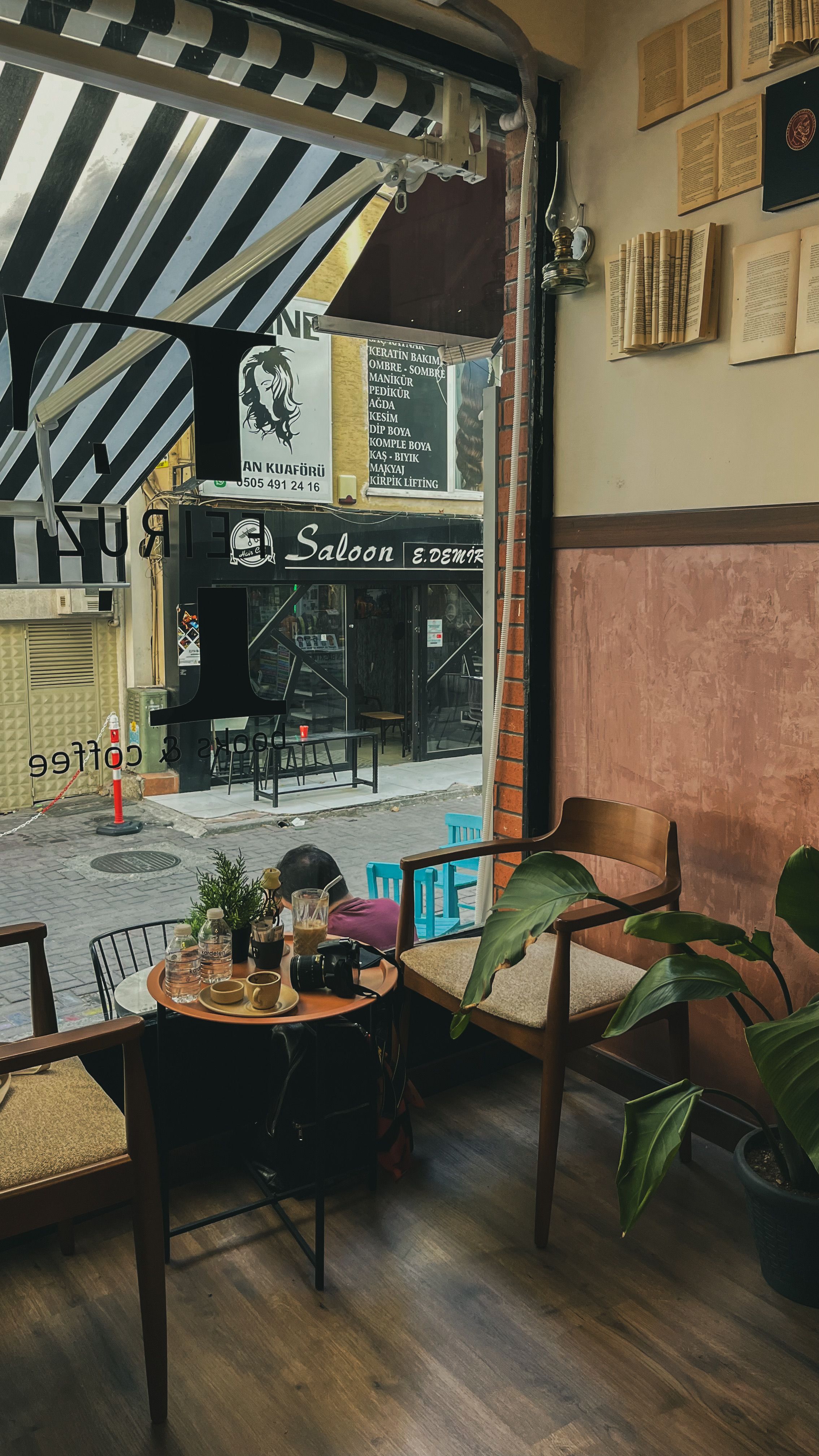 Cozy Coffee Shop Interior with Street View · Free Stock Photo