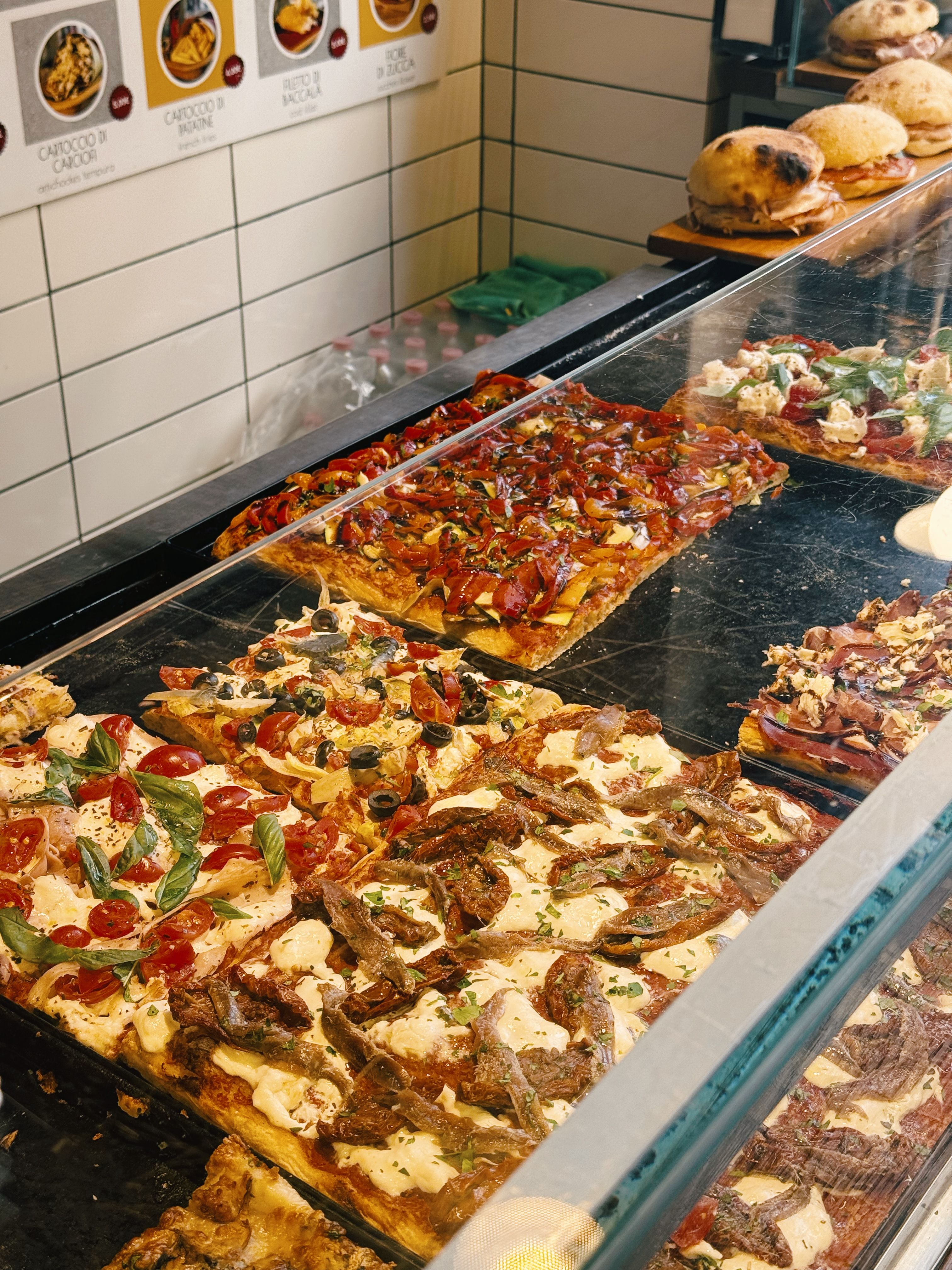 Delicious Variety of Italian Pizzas on Display · Free Stock Photo