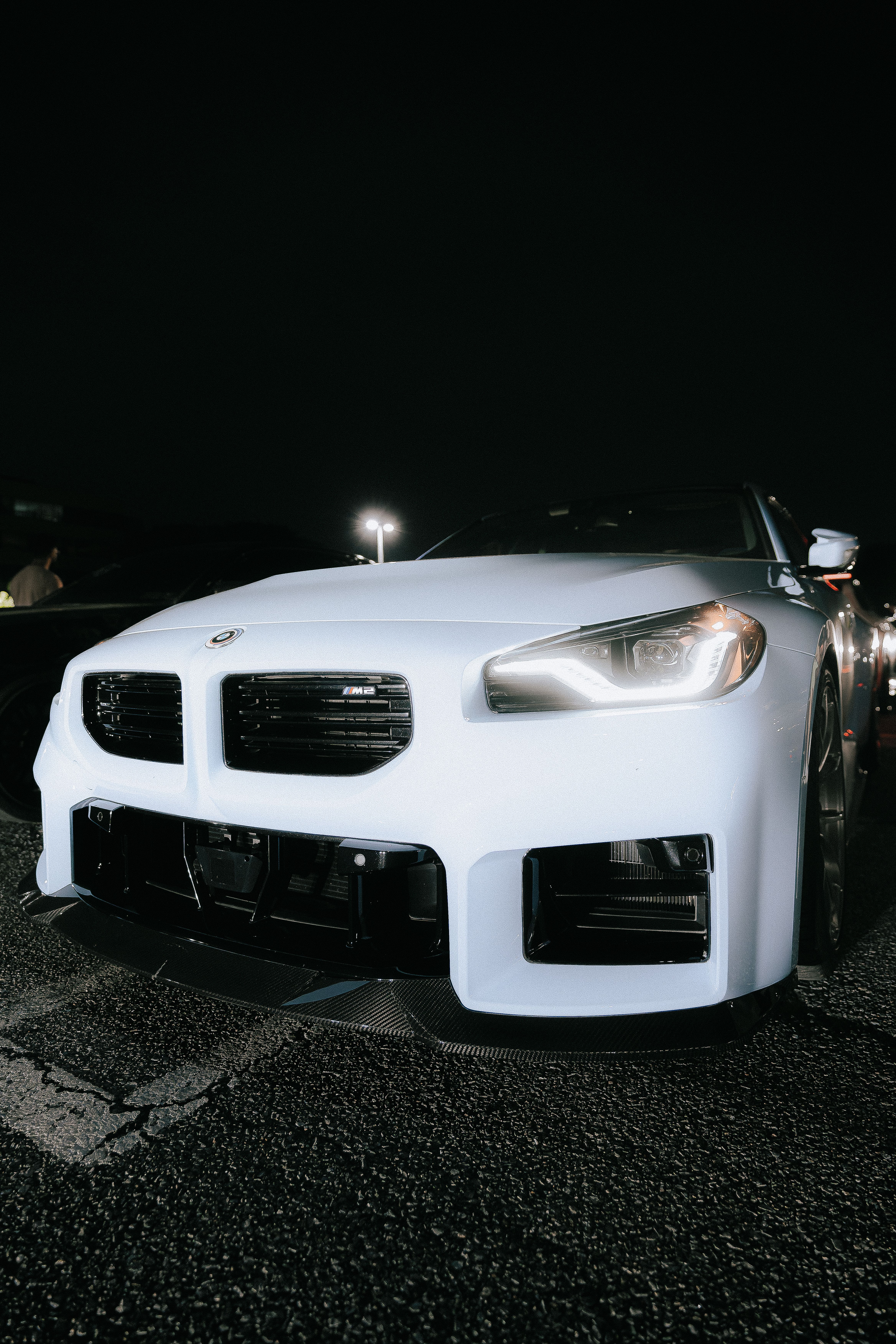 Sleek White Car at Night Street Setting · Free Stock Photo