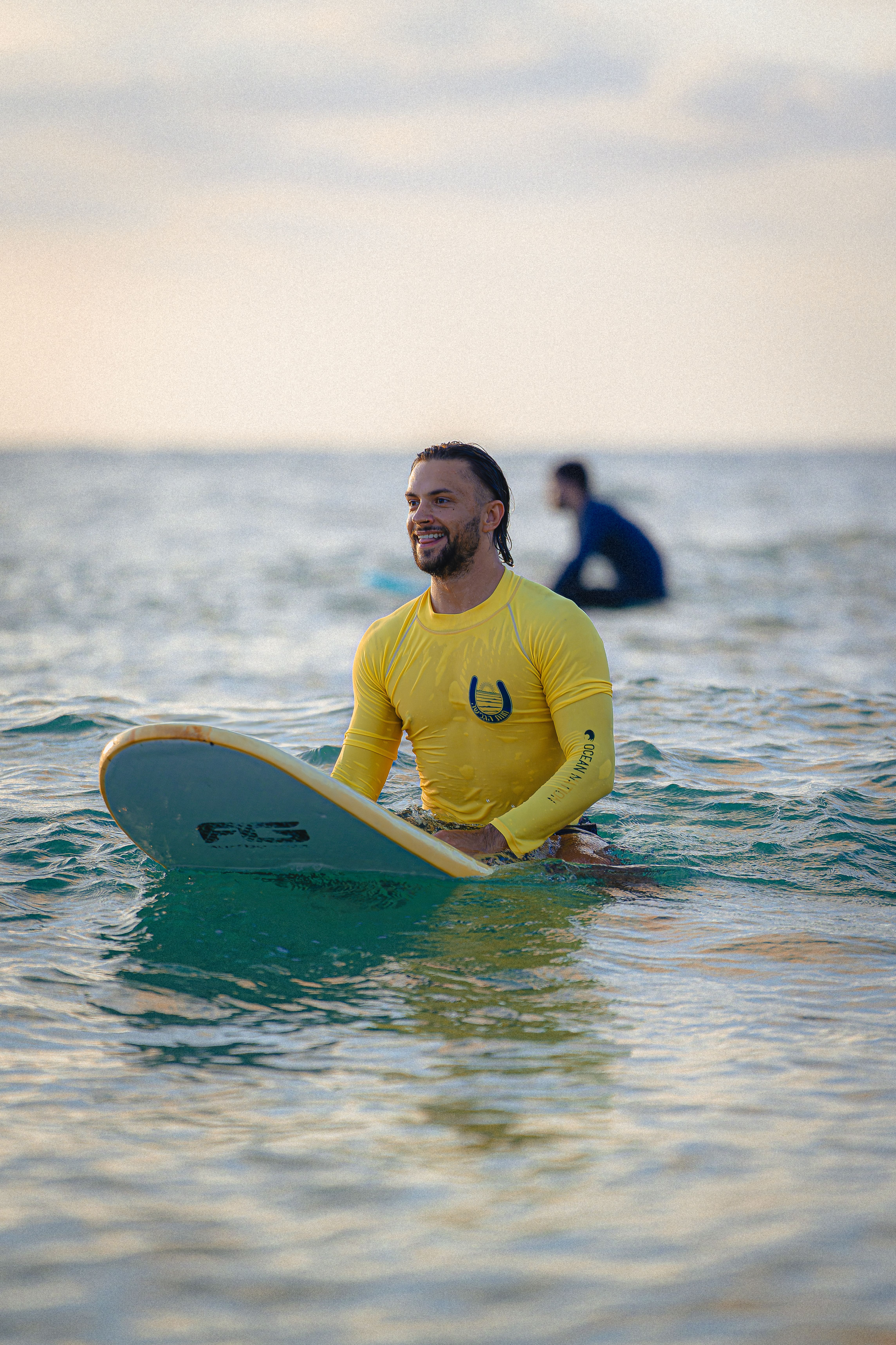 Man Surfing in Tel Aviv at Sunset · Free Stock Photo