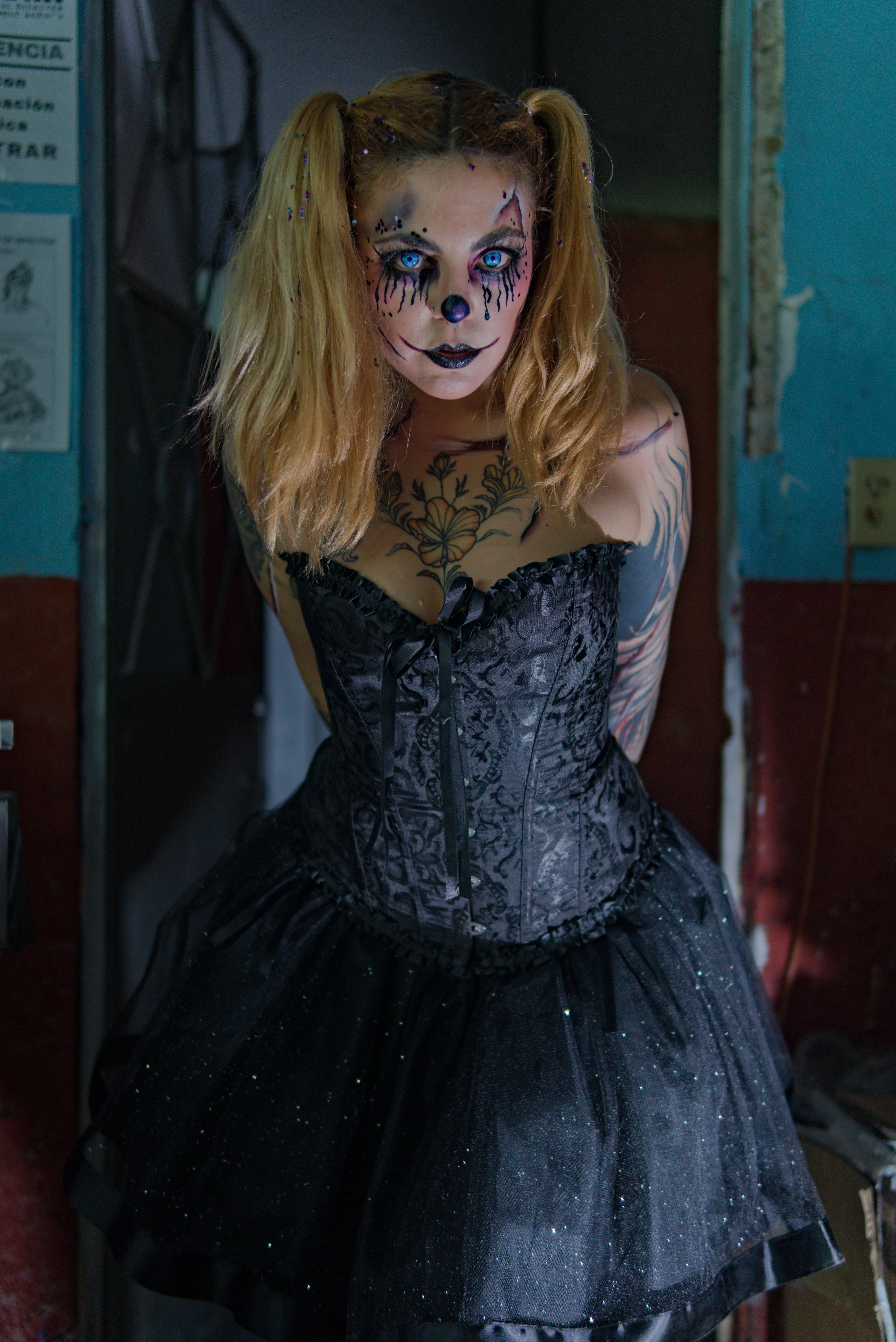 Gothic Clown Costume with Dramatic Makeup · Free Stock Photo
