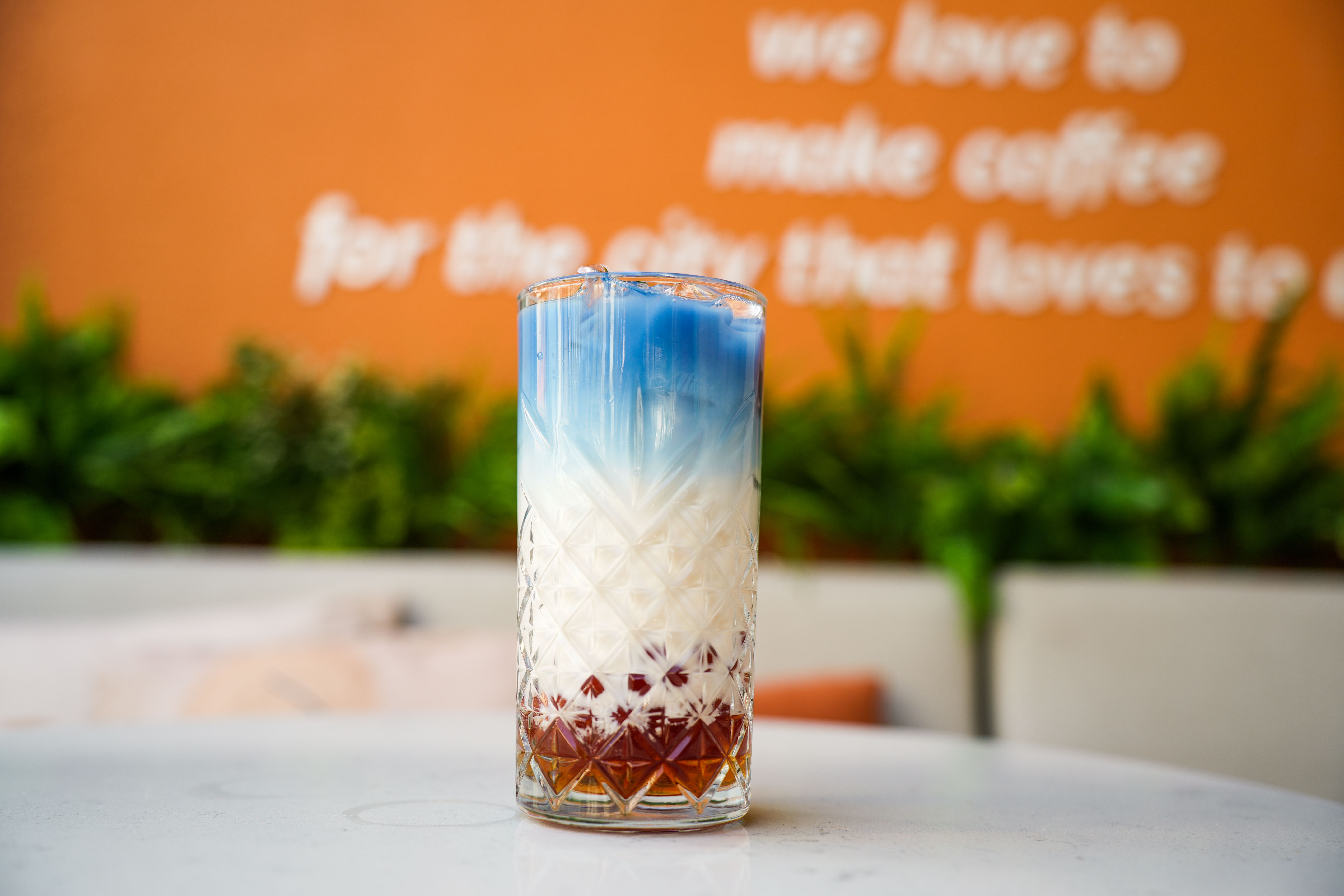 Colorful Layered Drink in Elegant Glass · Free Stock Photo