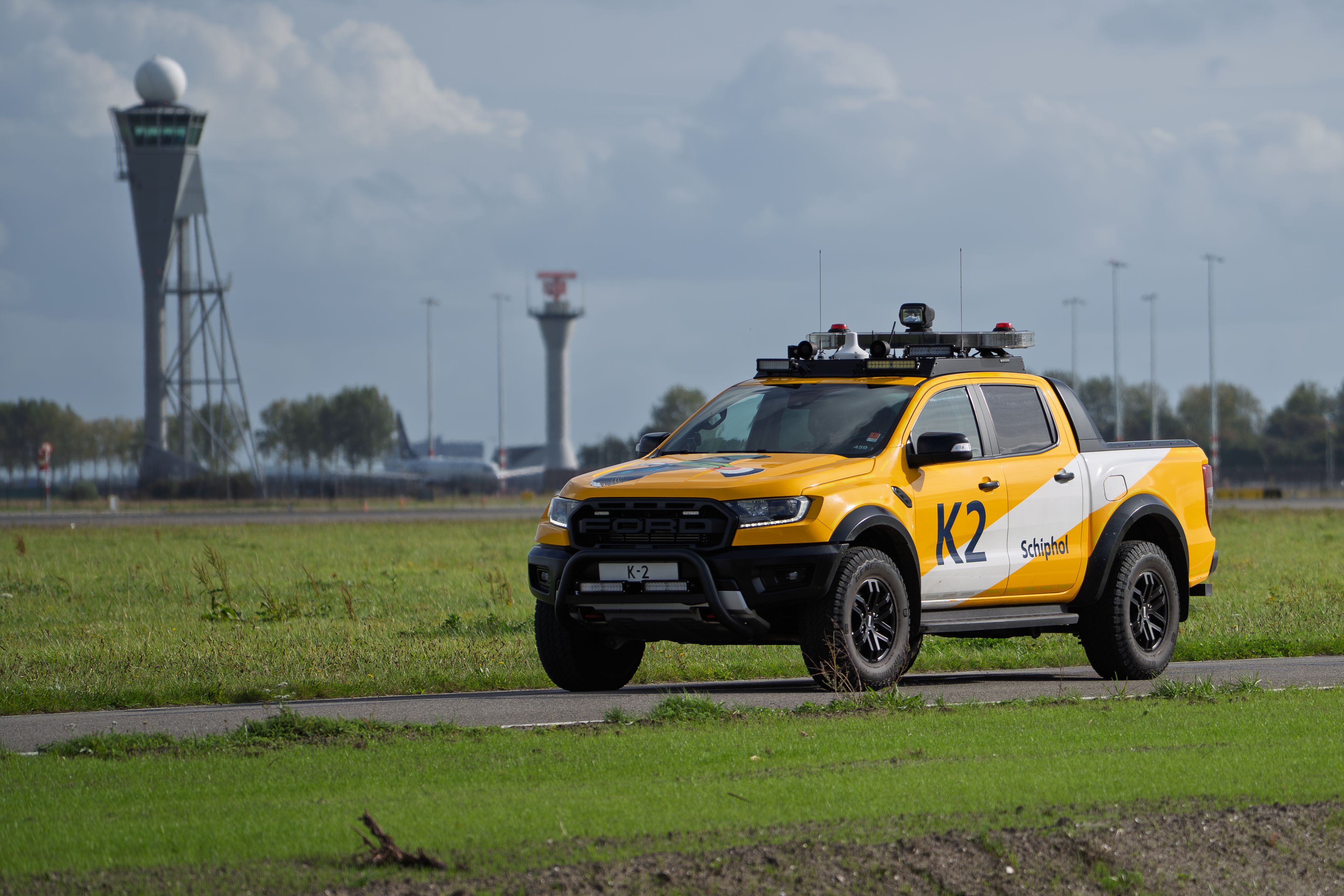 Airport Service Vehicle at Schiphol Airport · Free Stock Photo