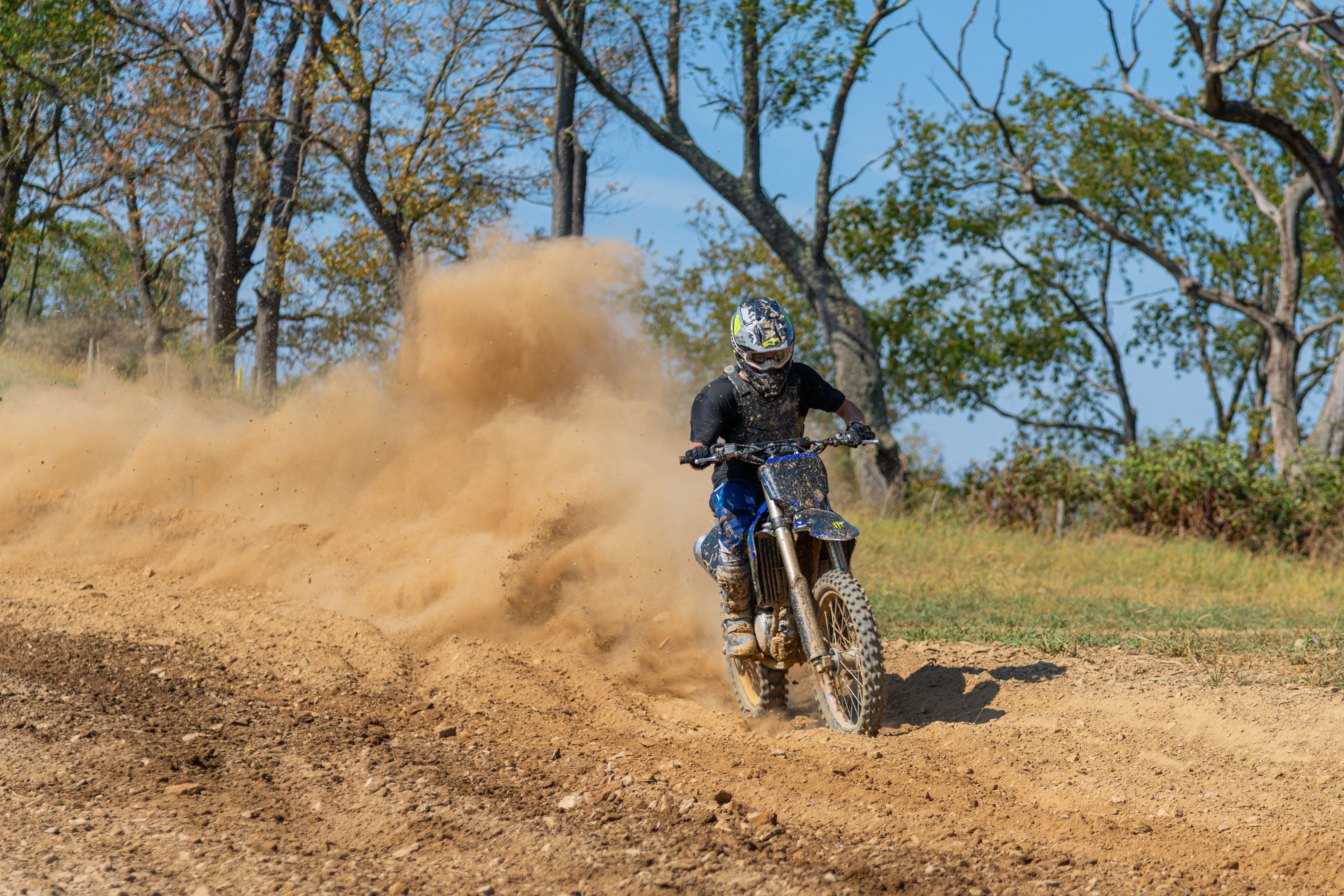 Dynamic Dirt Bike Racing on Off-Road Trail · Free Stock Photo