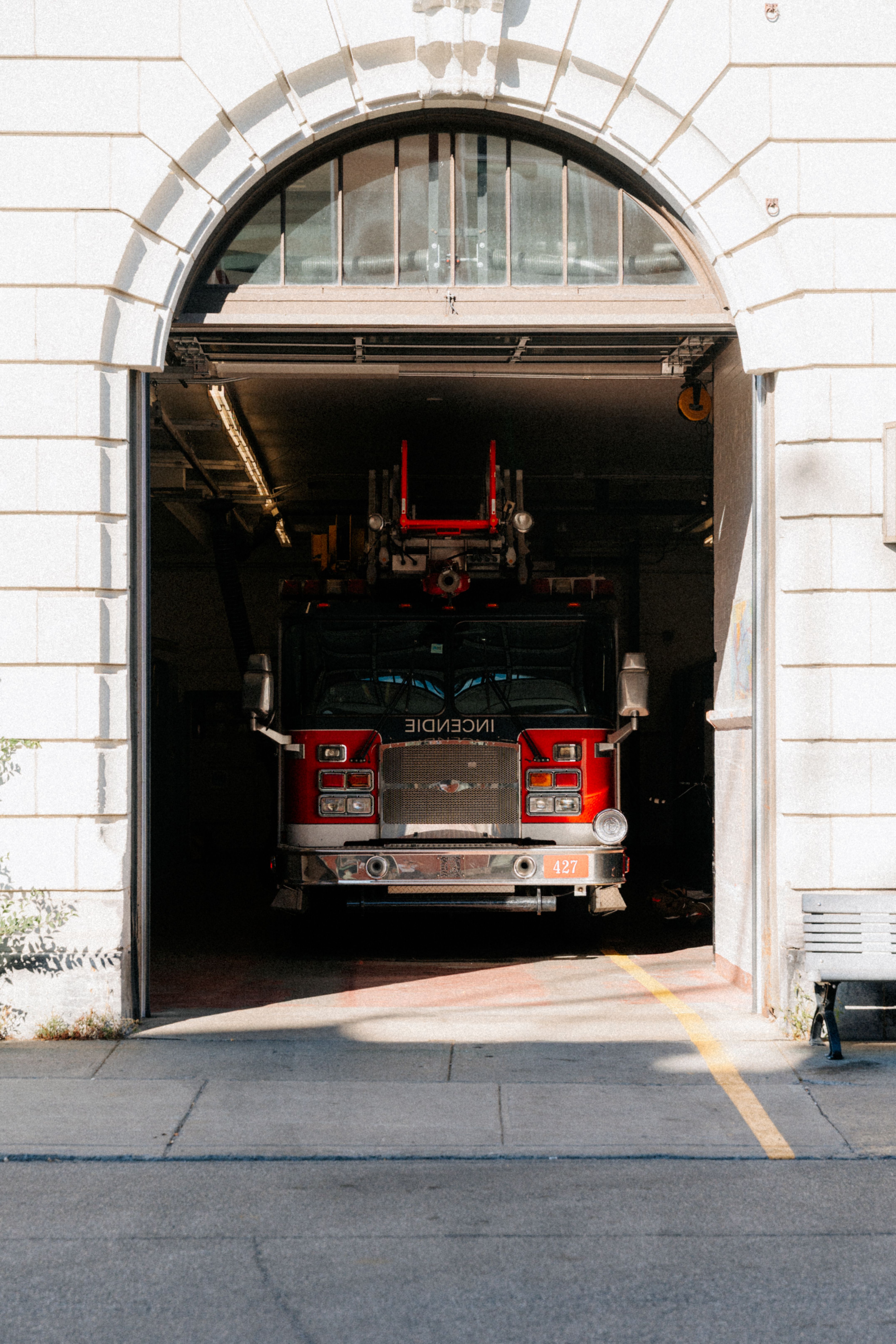 Fire Truck in Historic Montréal Fire Station · Free Stock Photo