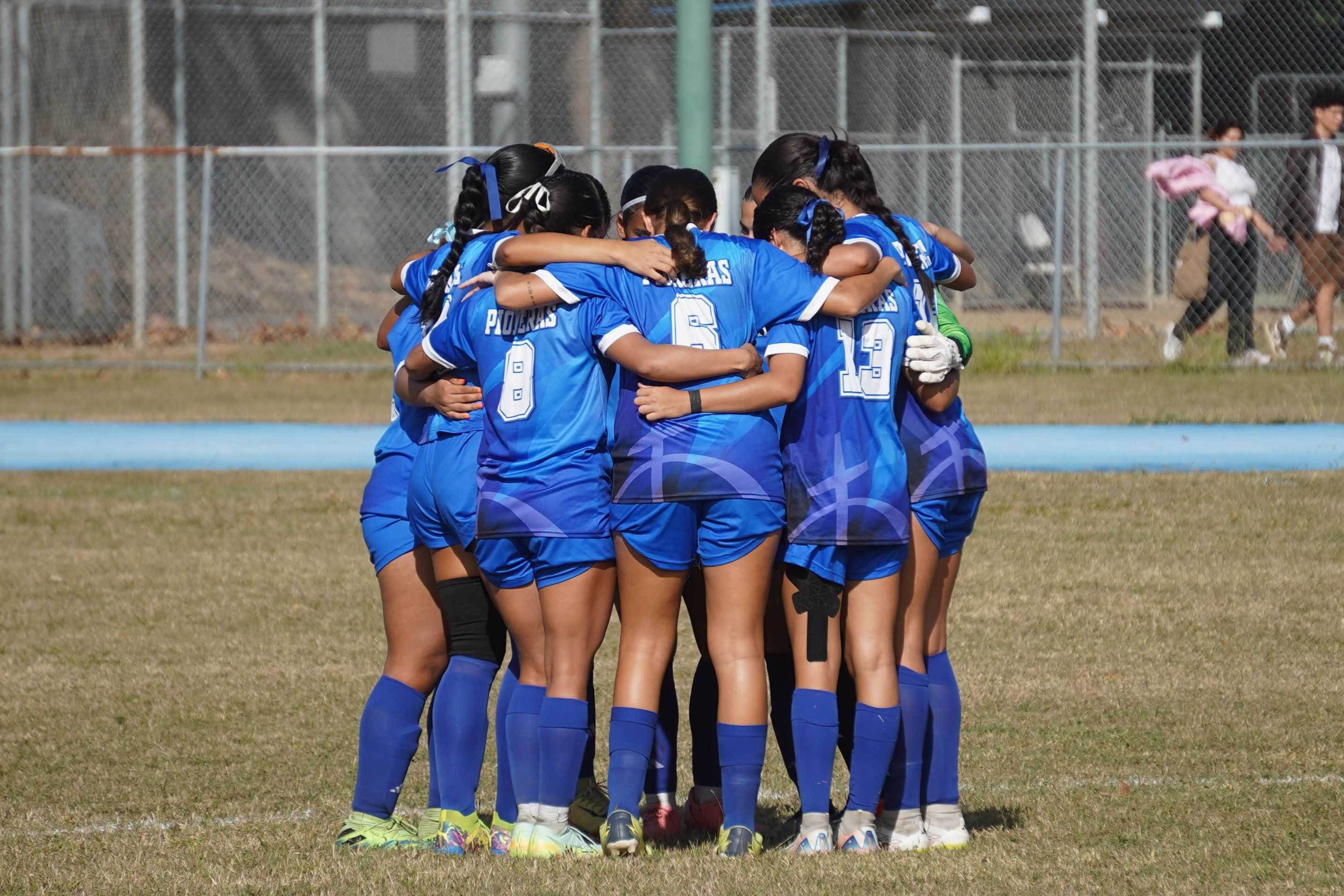 Female Soccer Team Huddle Before Match · Free Stock Photo