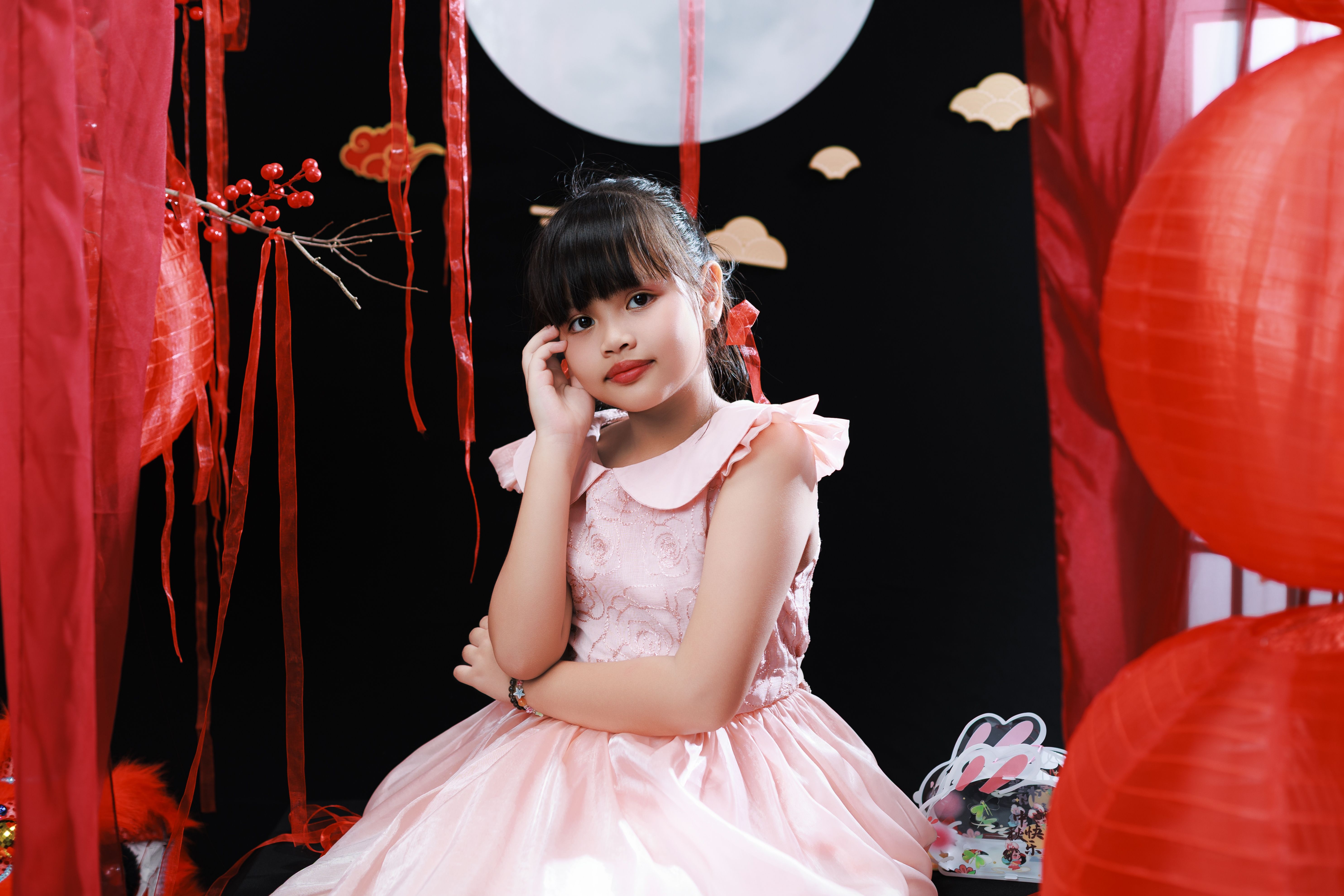 Young Girl in Traditional Lunar New Year Decor · Free Stock Photo