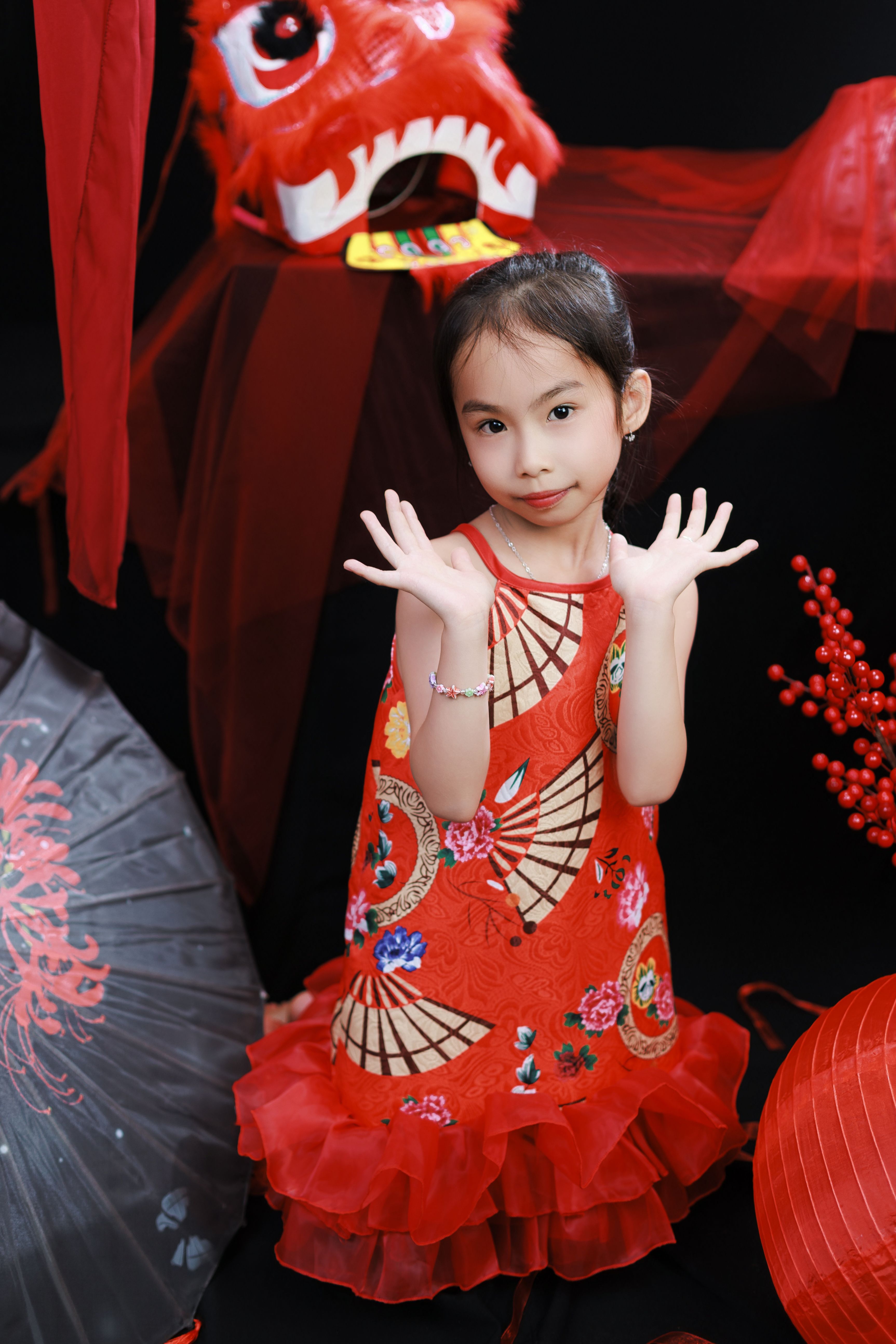 Young Girl Celebrating Lunar New Year in Red Dress · Free Stock Photo
