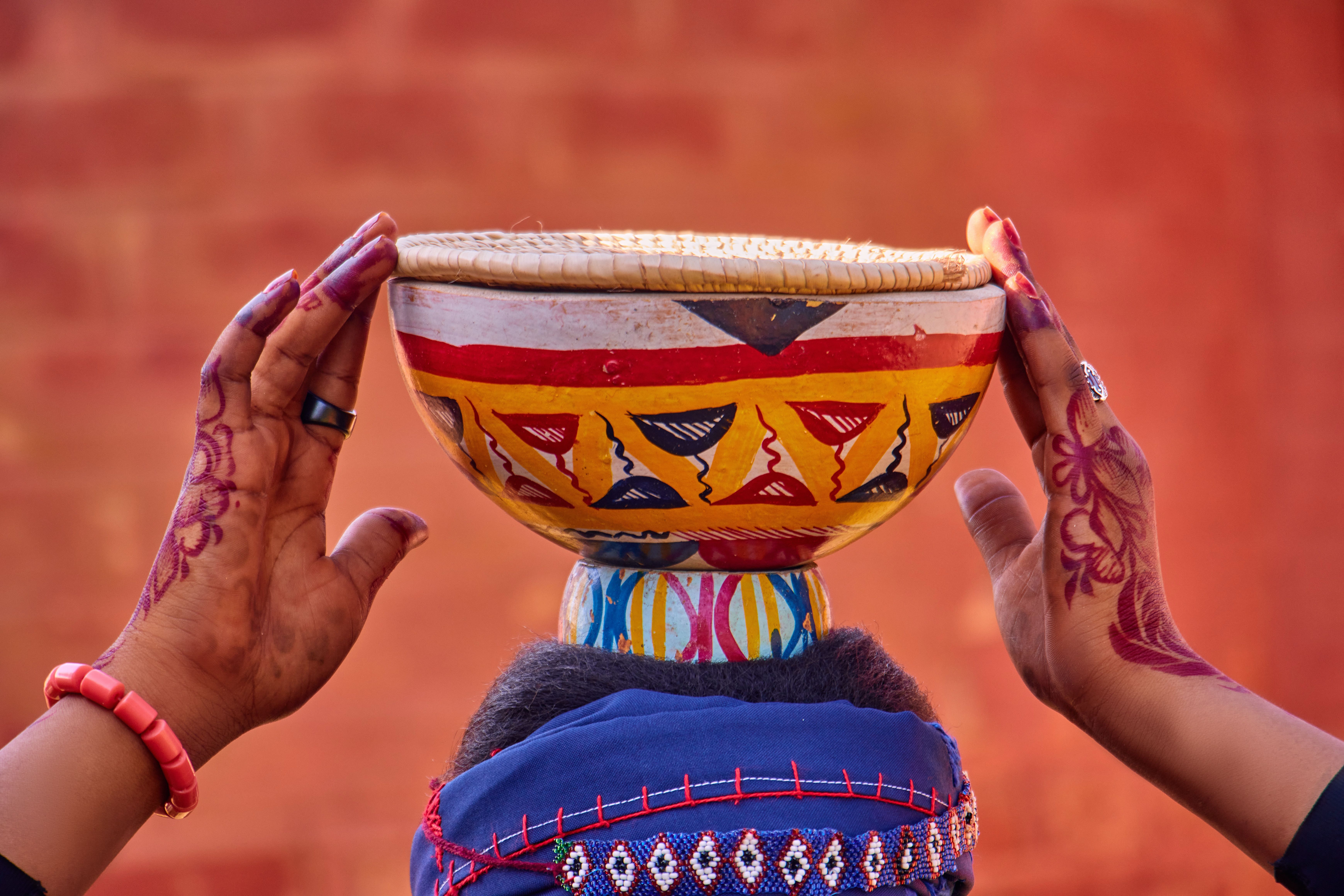 Colorful Pot on Woman's Head with Henna Designs · Free Stock Photo