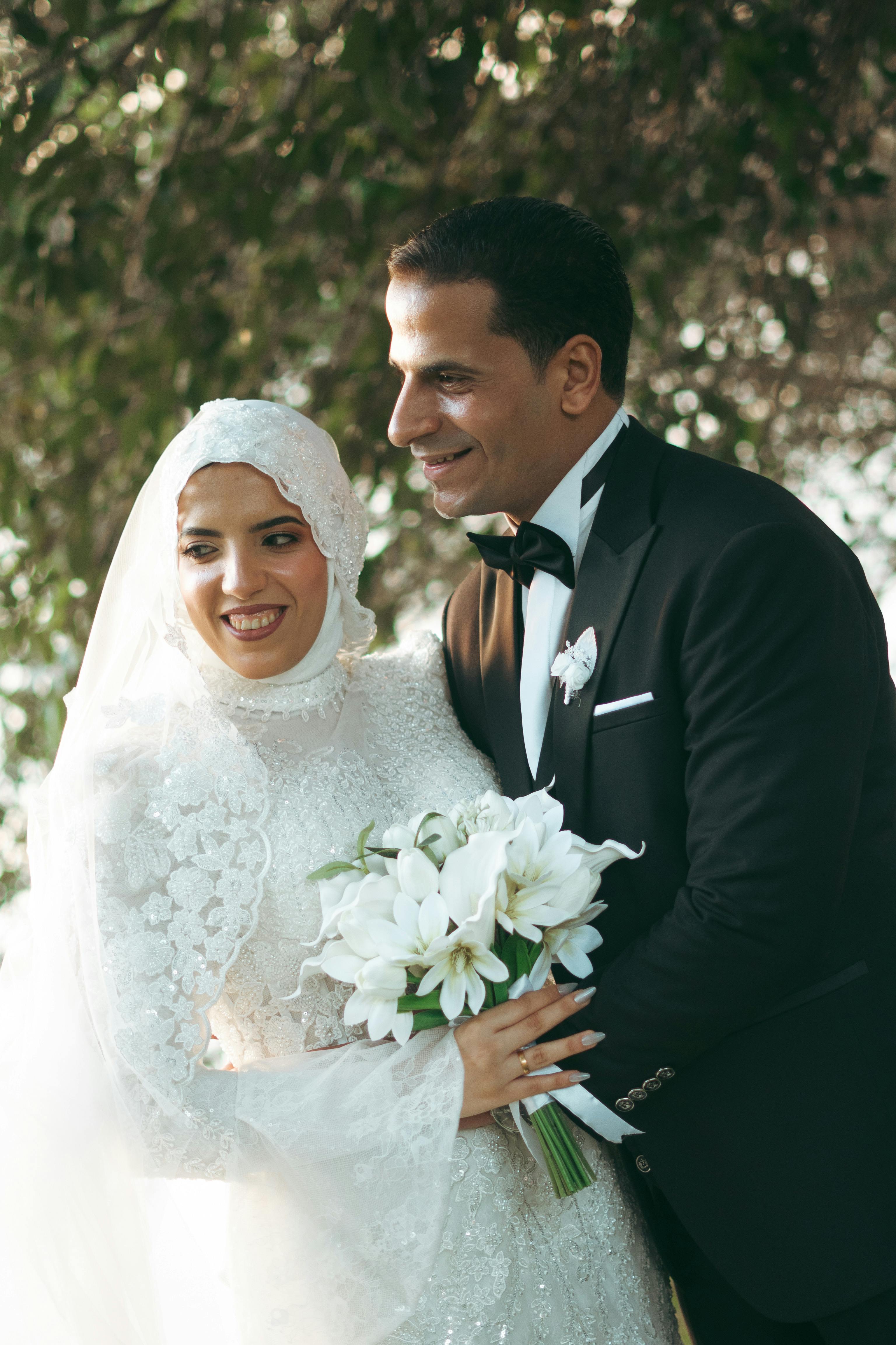 Elegant Outdoor Wedding Portrait of a Happy Couple · Free Stock Photo