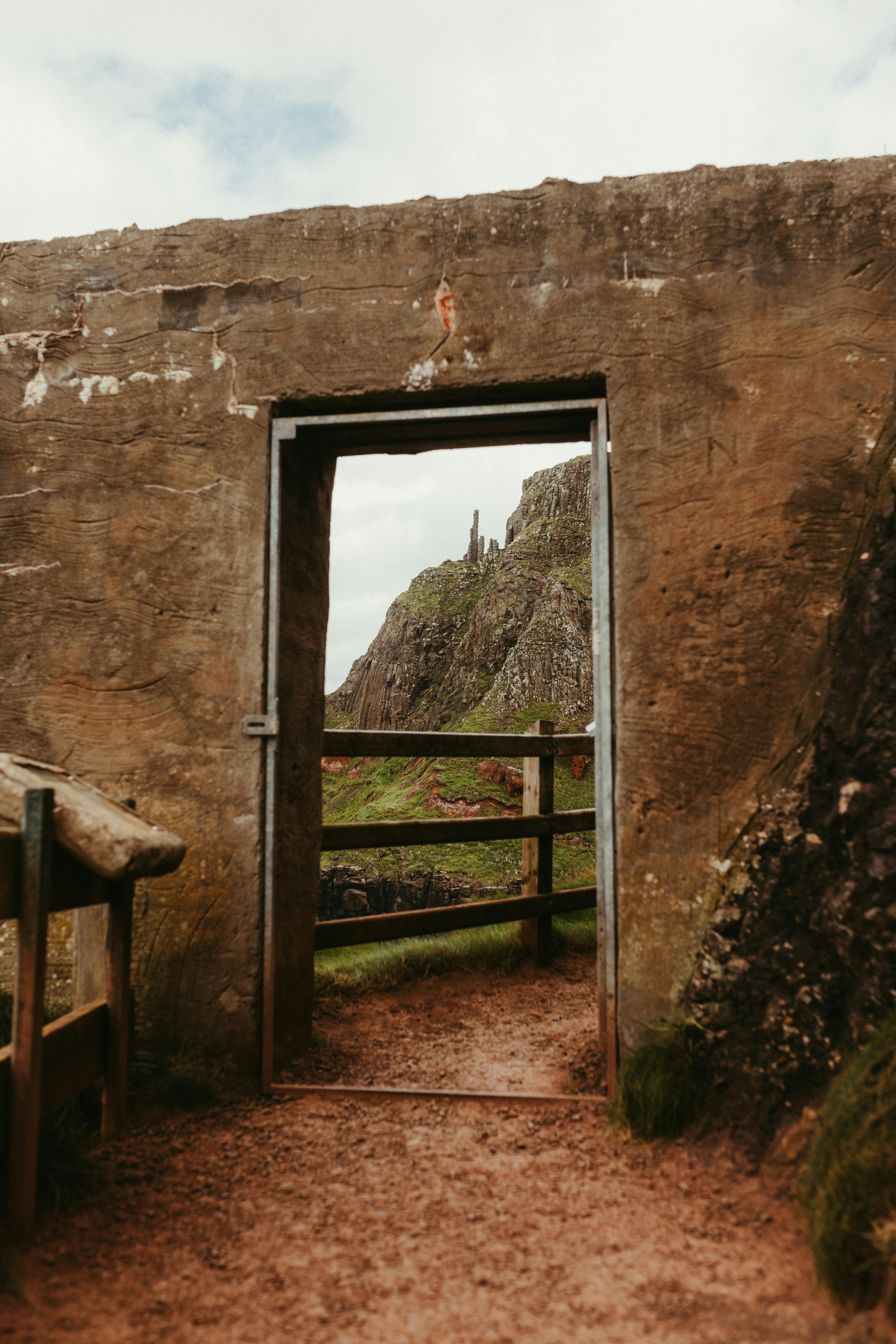Scenic View Through Rustic Stone Doorway in Ireland · Free Stock Photo
