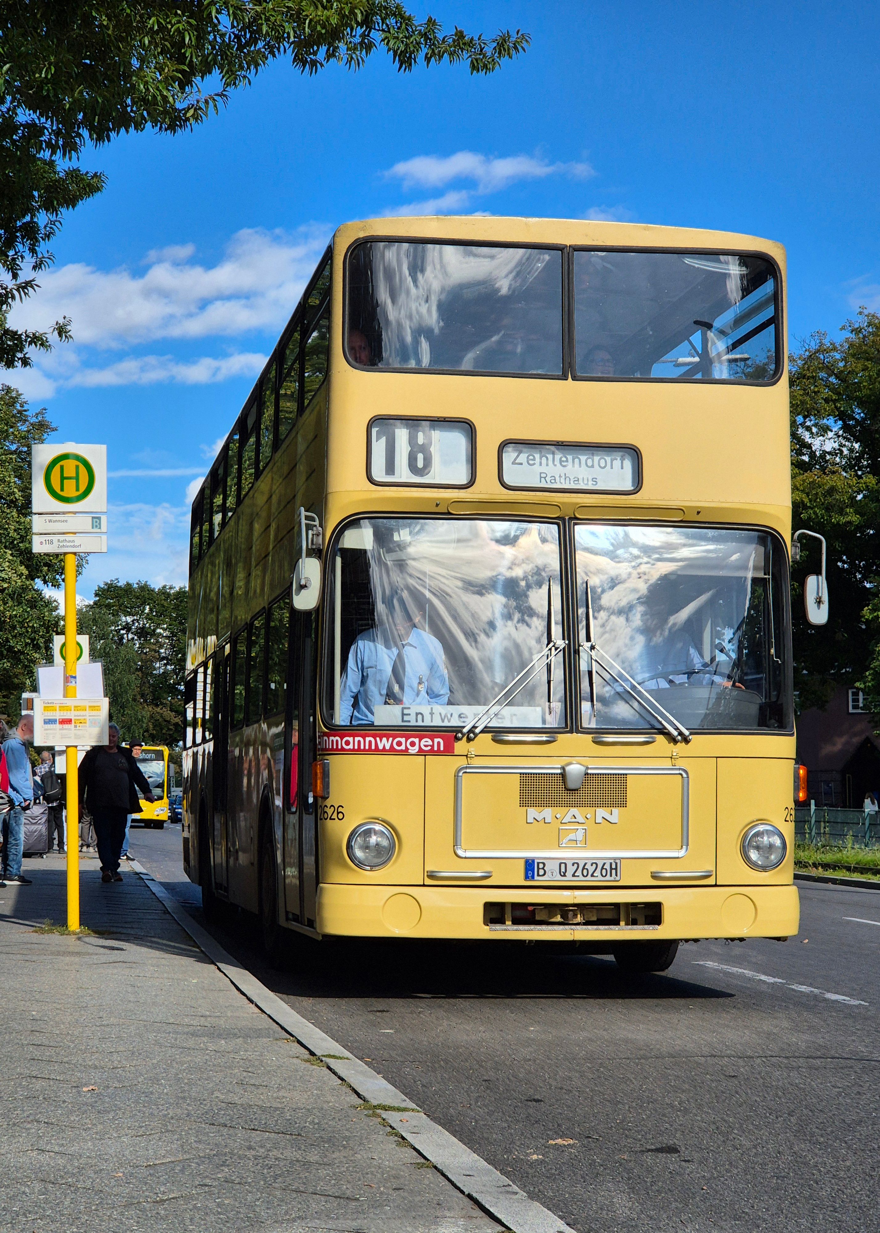 Classic Double-Decker Bus in Urban Setting · Free Stock Photo