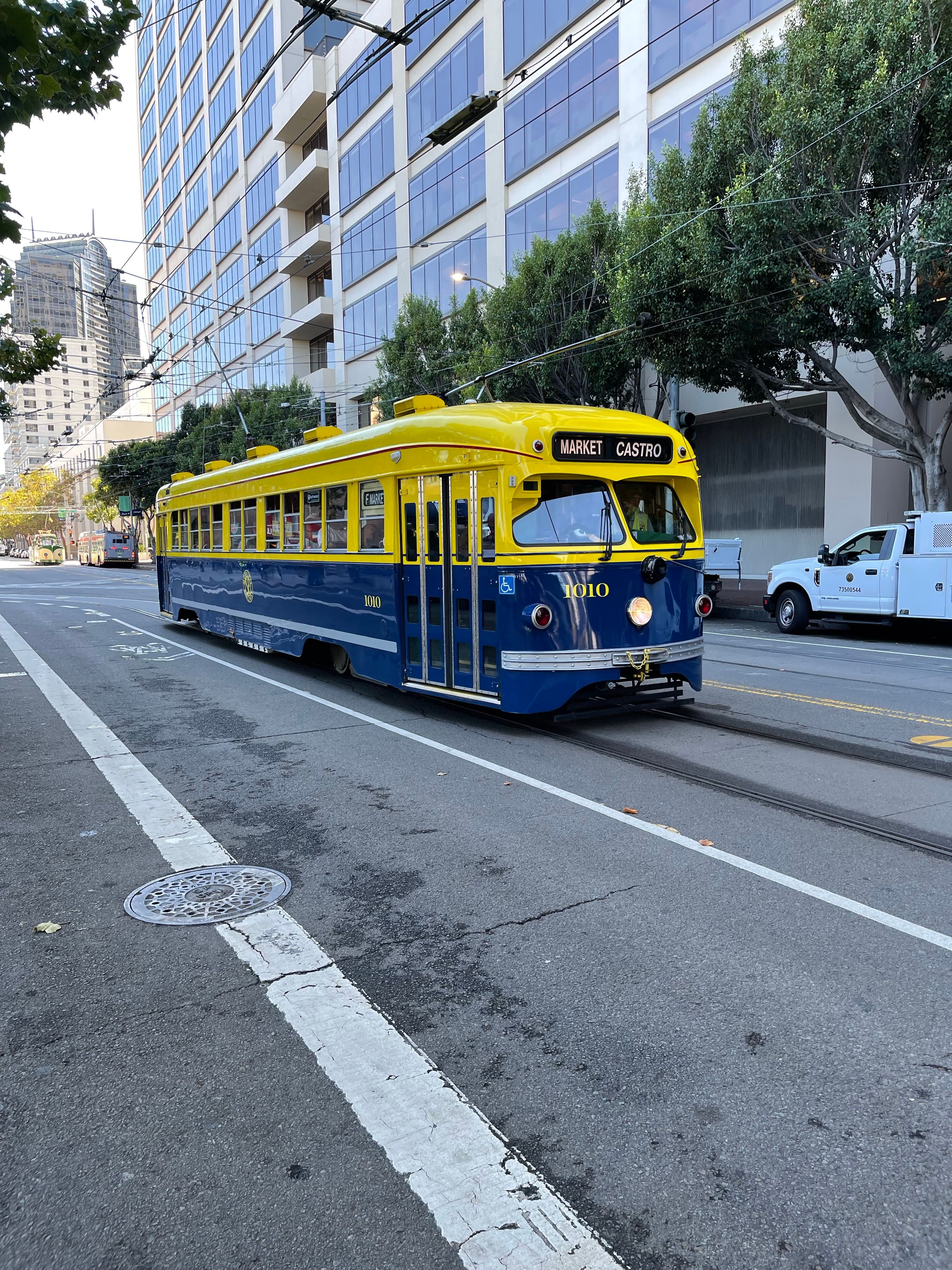 Vintage Blue and Yellow Streetcar on San Francisco Street · Free Stock ...