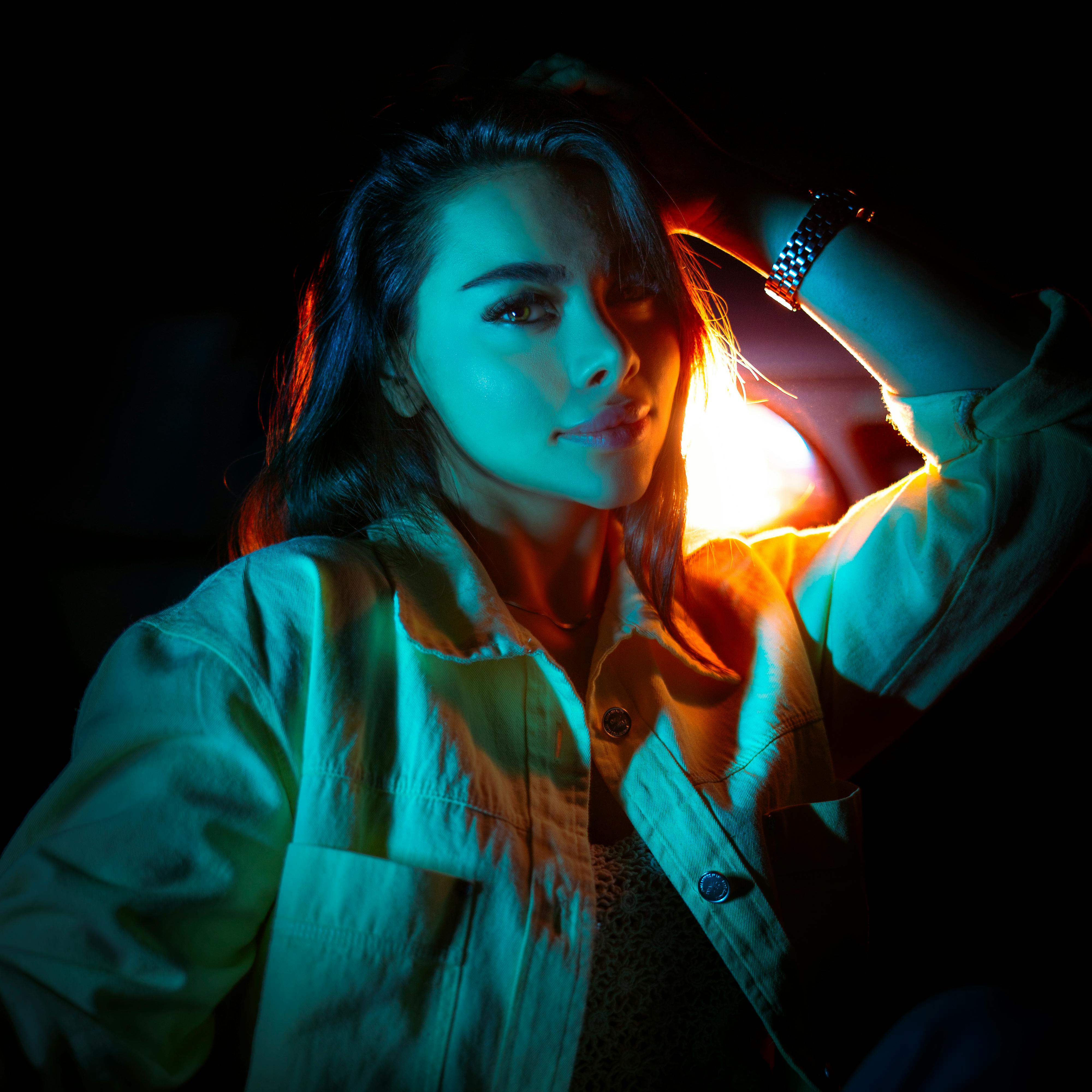 Moody Portrait of a Woman with Dramatic Lighting · Free Stock Photo