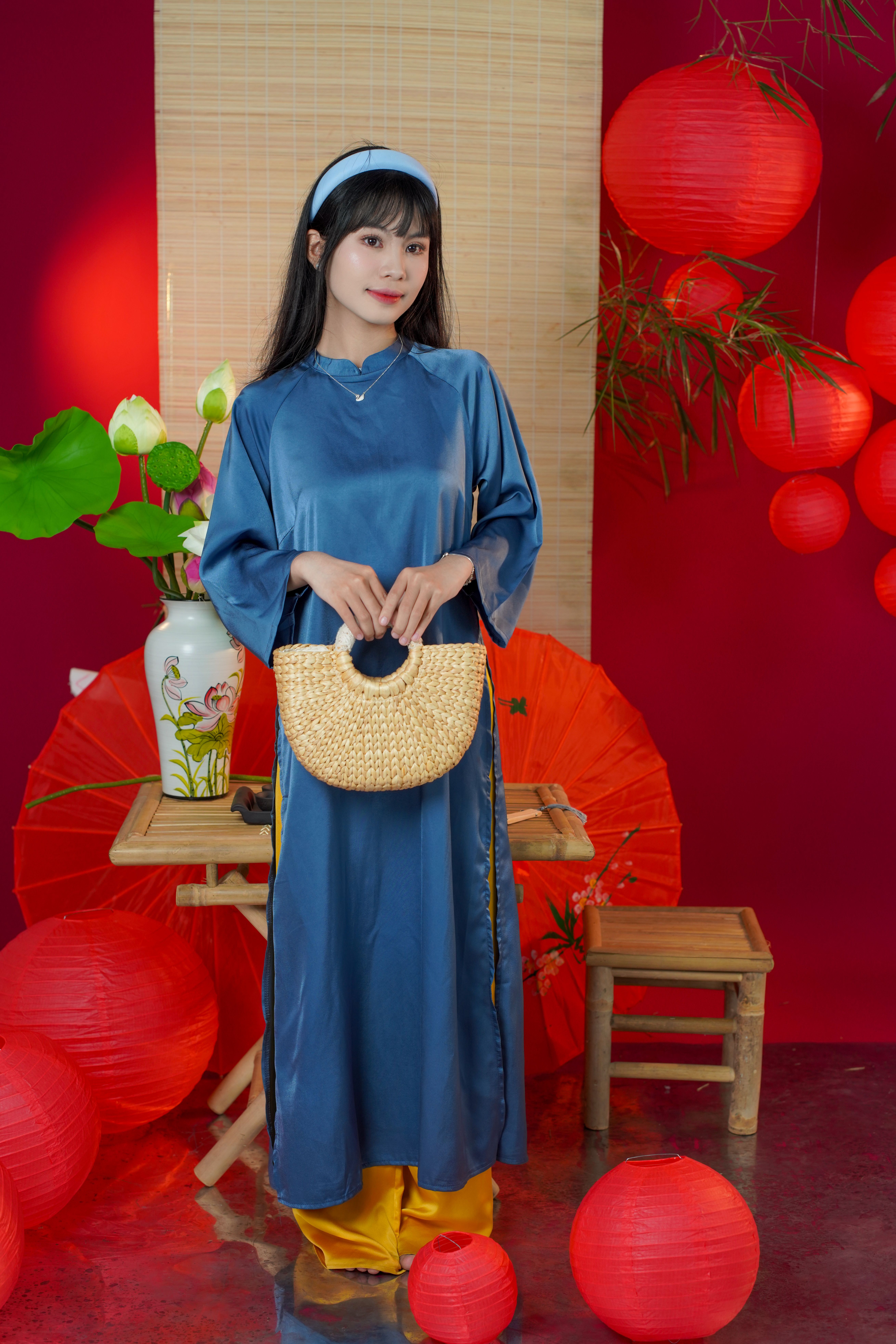 Woman in Traditional Blue Dress with Red Lanterns · Free Stock Photo