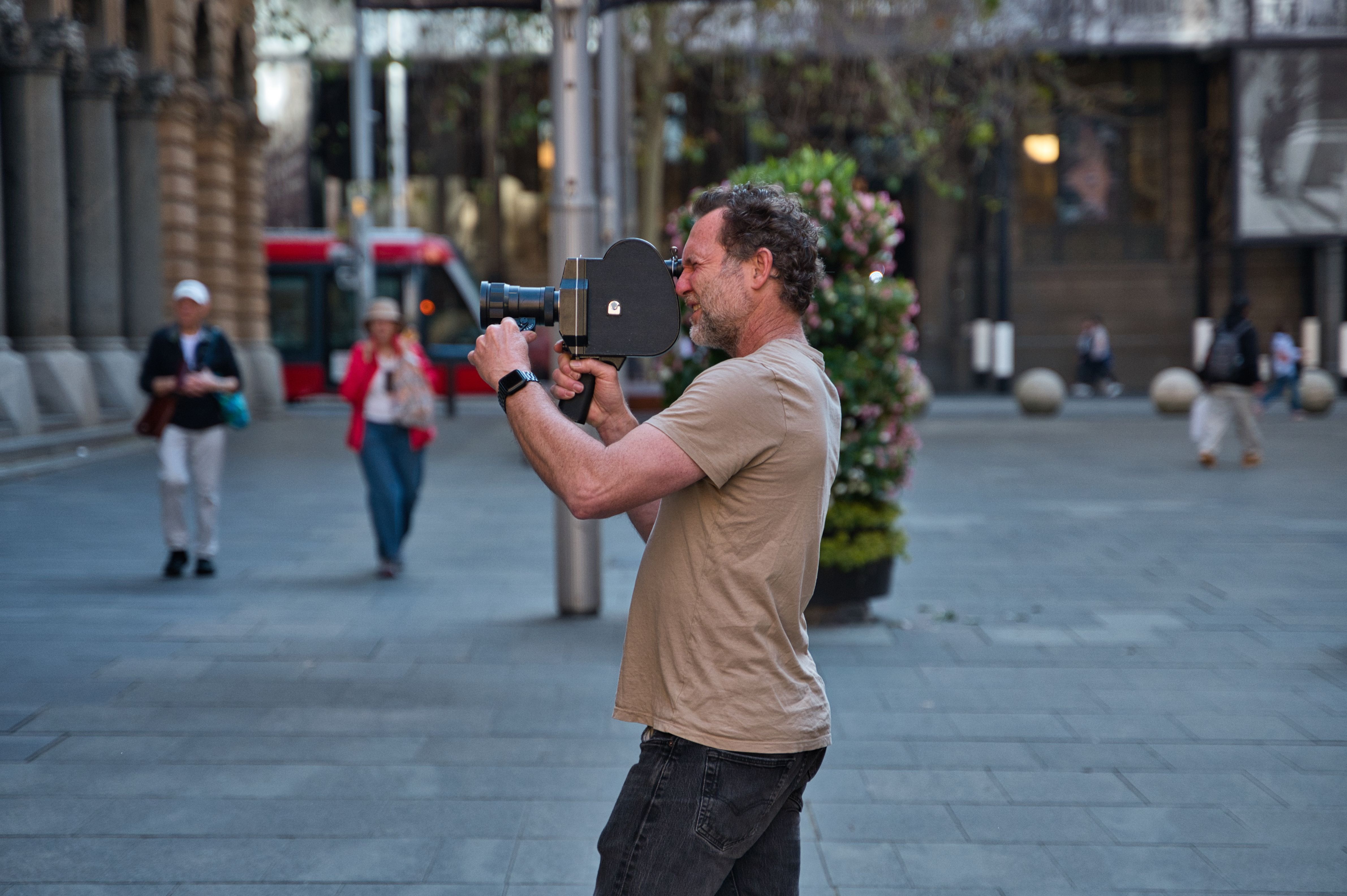 Street Photographer Filming in Sydney's Urban Scene · Free Stock Photo
