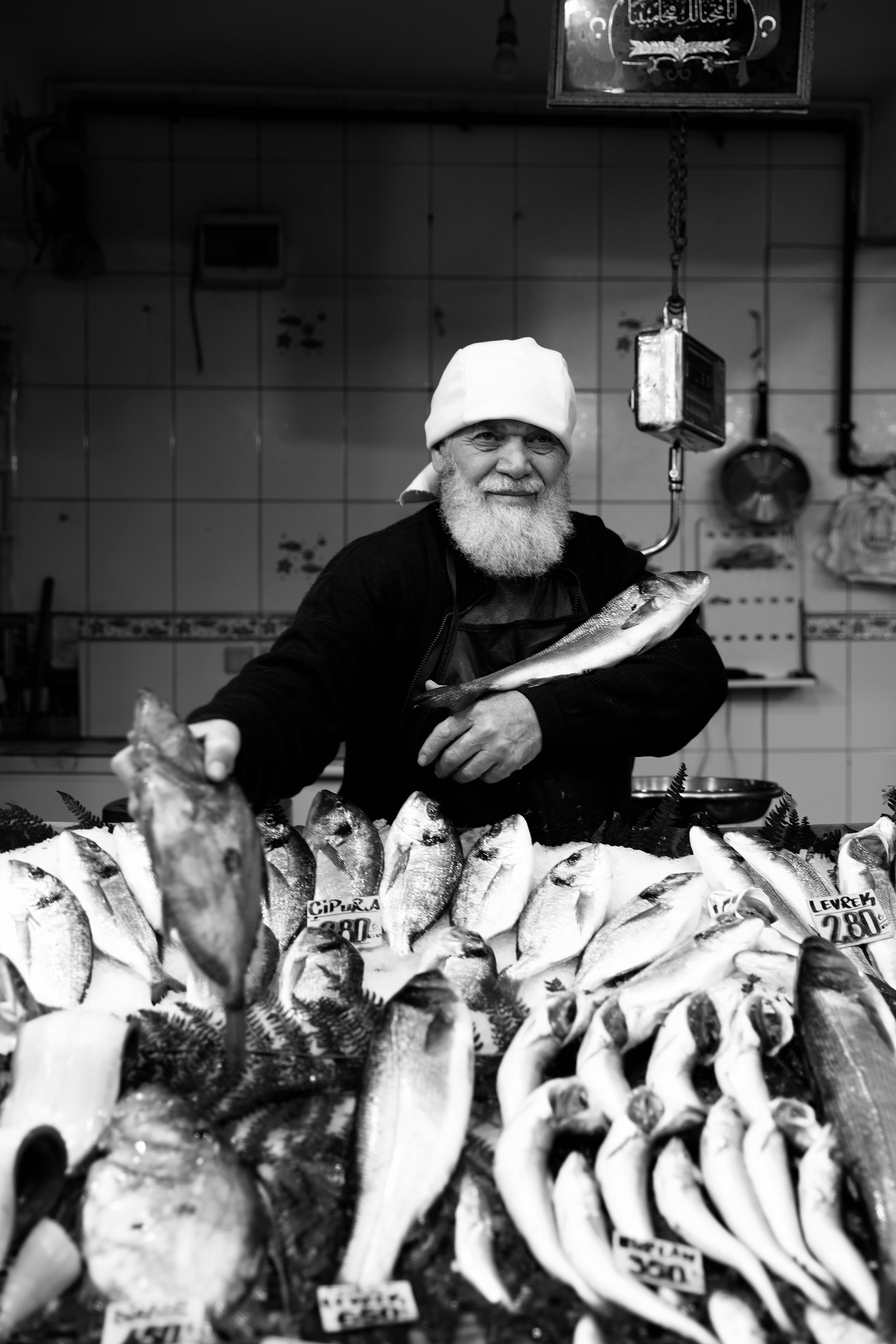 Smiling Fisherman Displaying Fresh Catch · Free Stock Photo