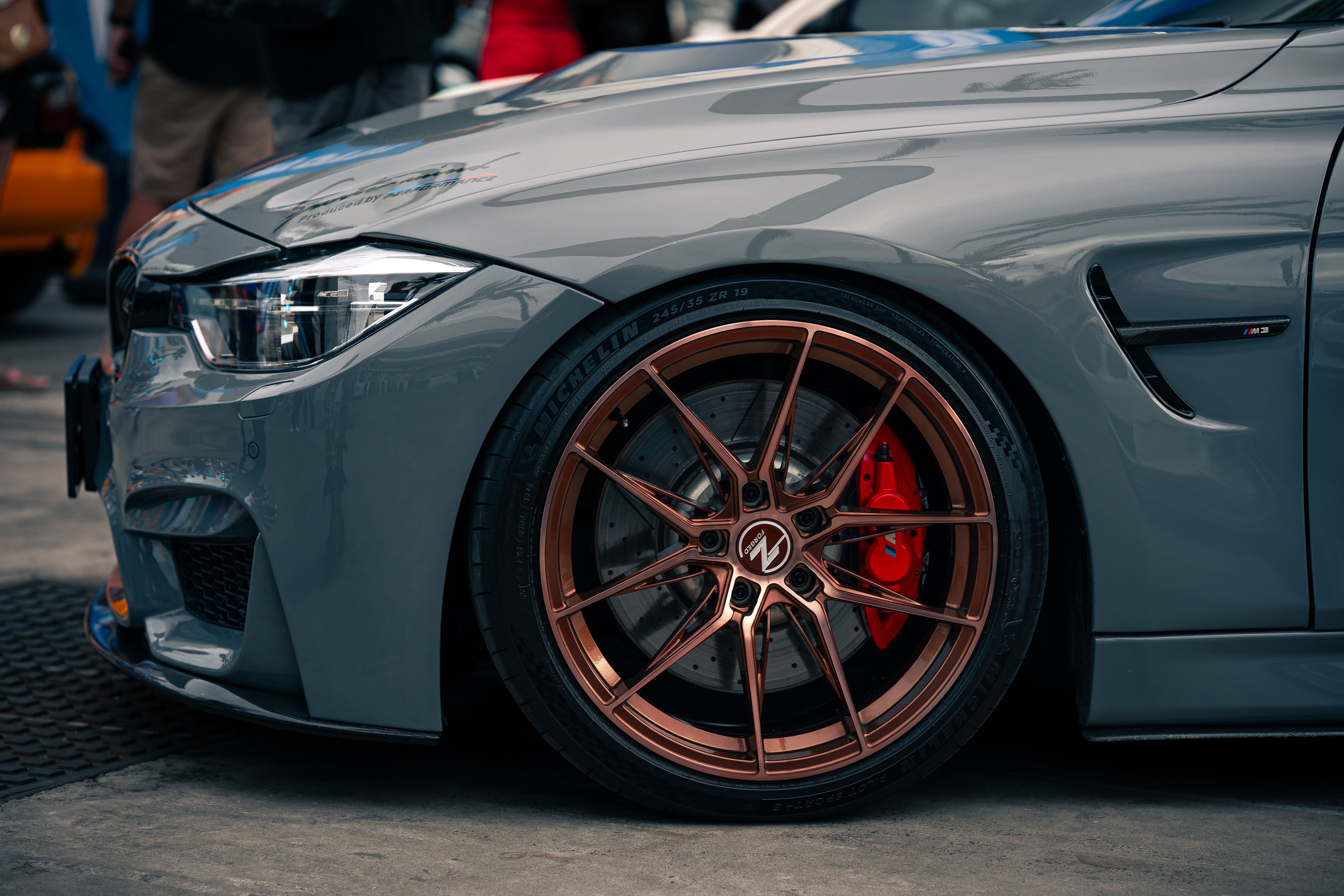 Close-Up of Customized BMW with Bronze Rims · Free Stock Photo
