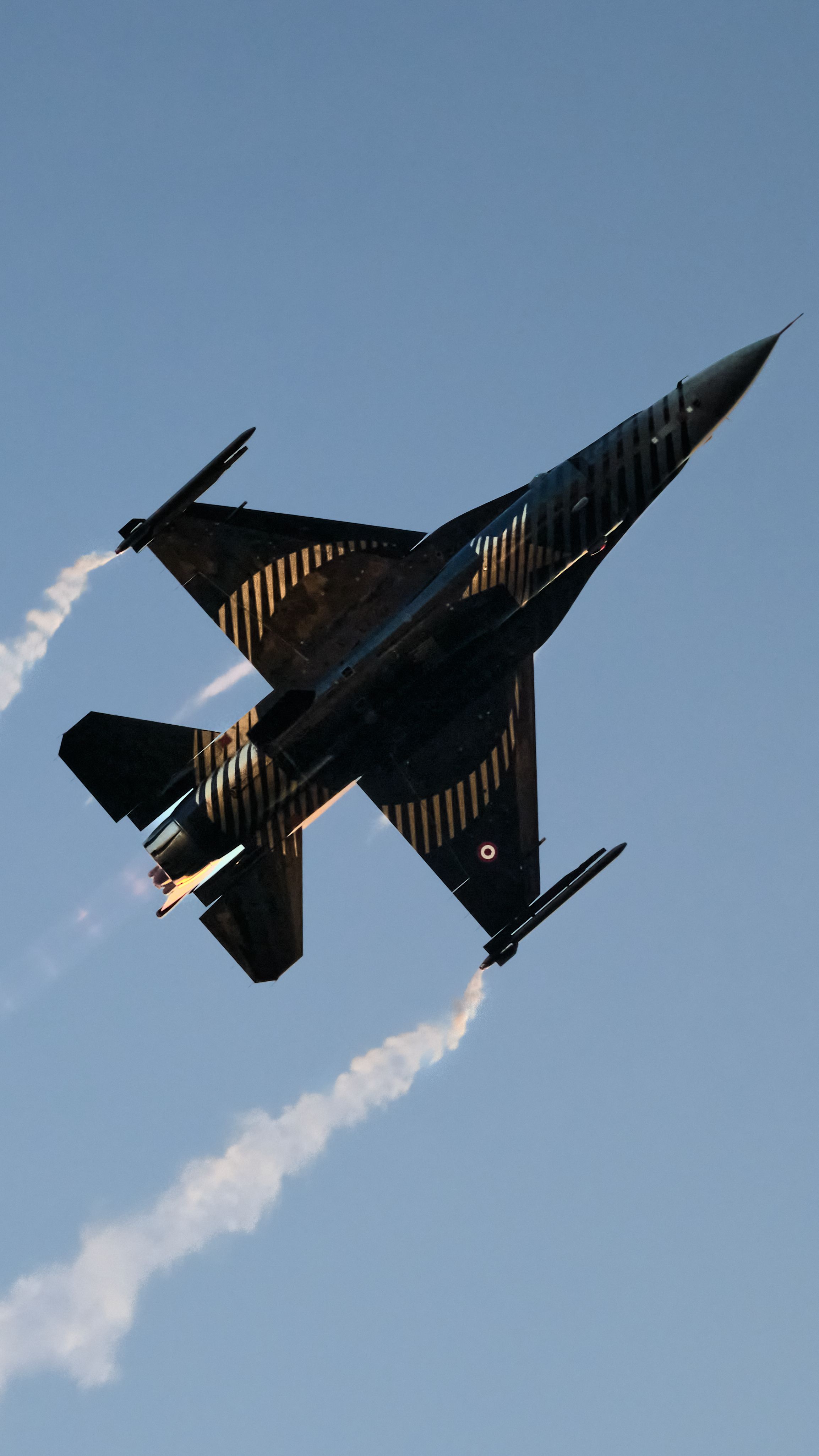Fighter Jet Performing Aerobatics in Clear Sky · Free Stock Photo