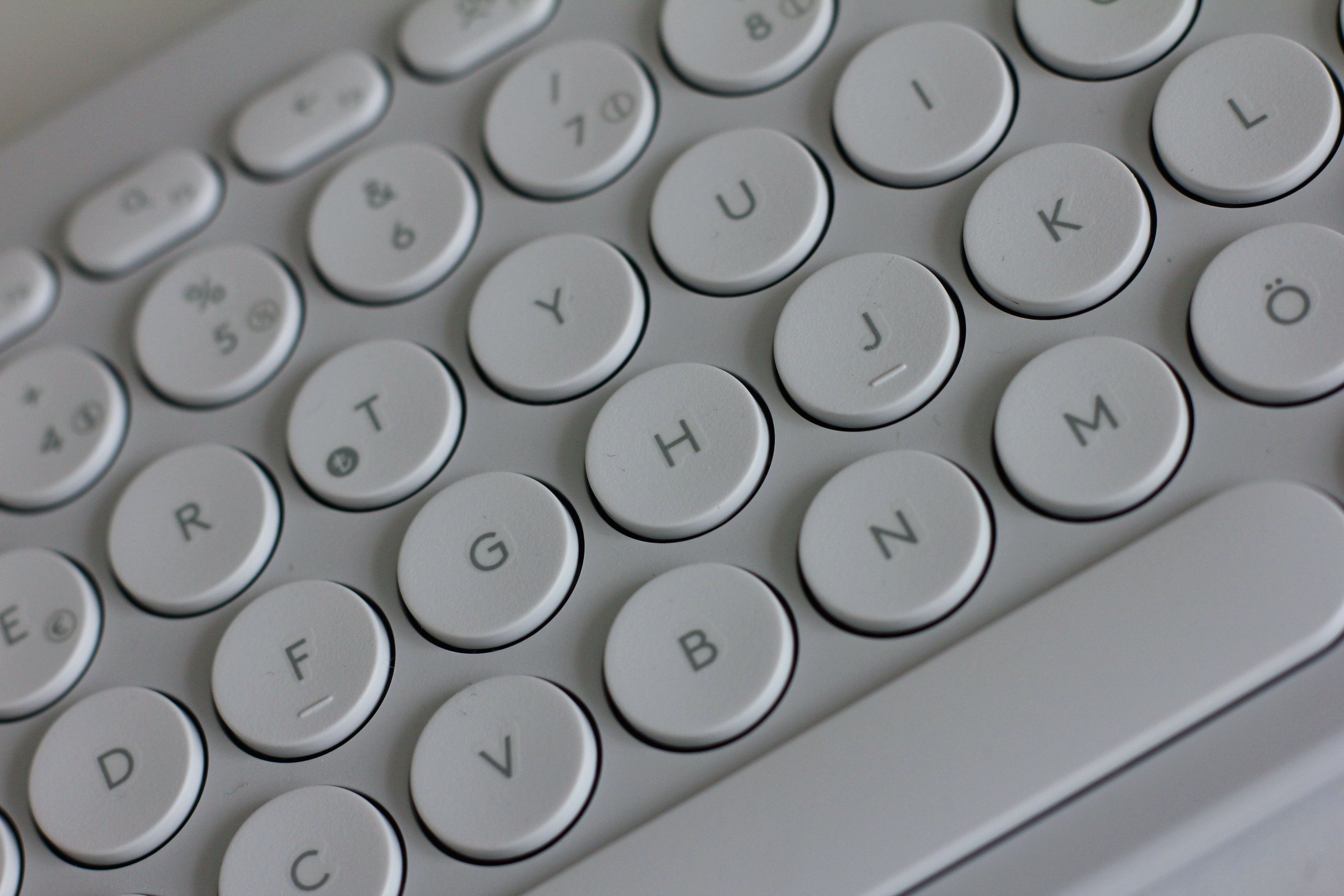 Close-Up Shot of Retro Style Keyboard Keys · Free Stock Photo
