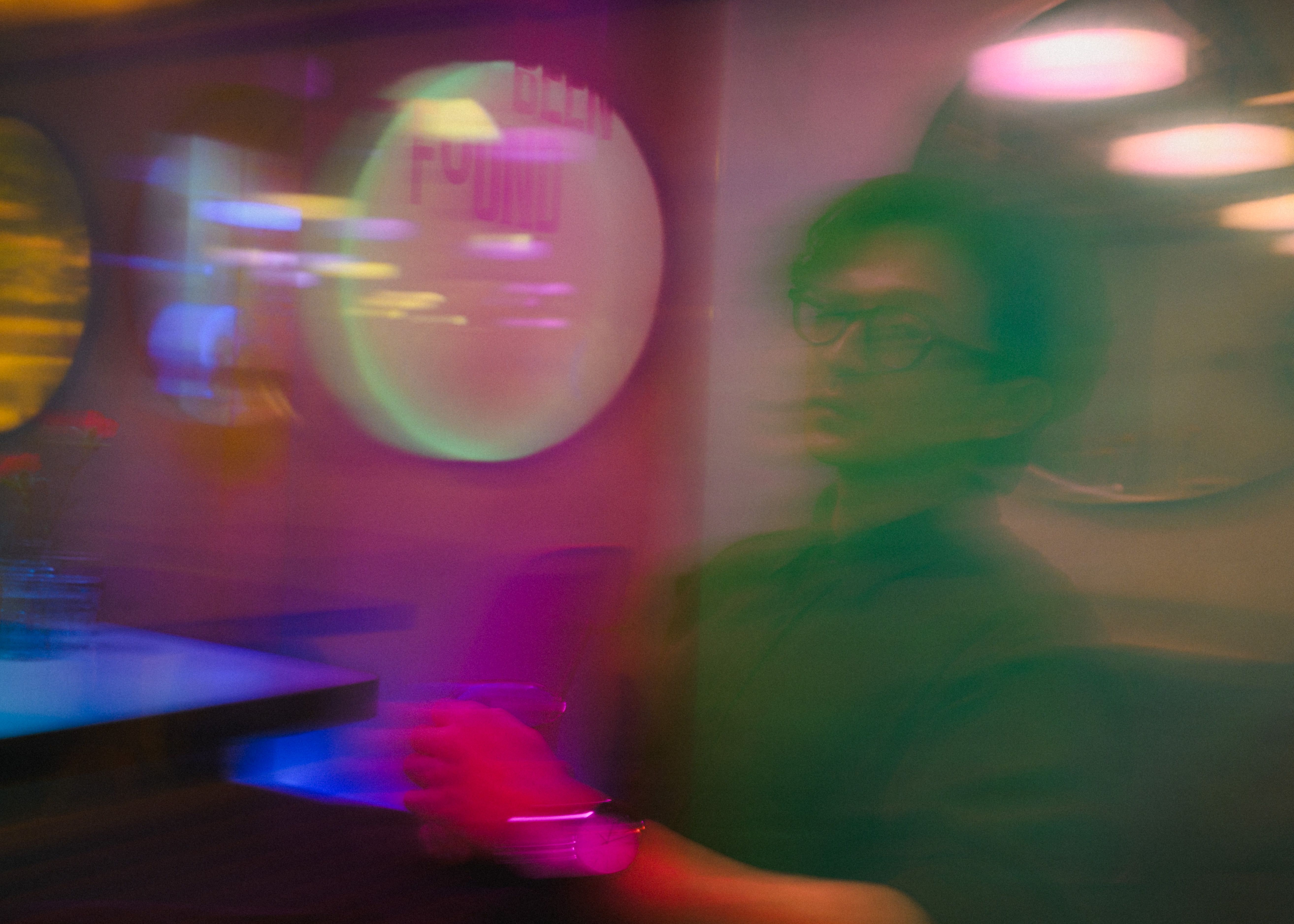 Blurry Artistic Portrait in Vibrant Neon Lighting · Free Stock Photo