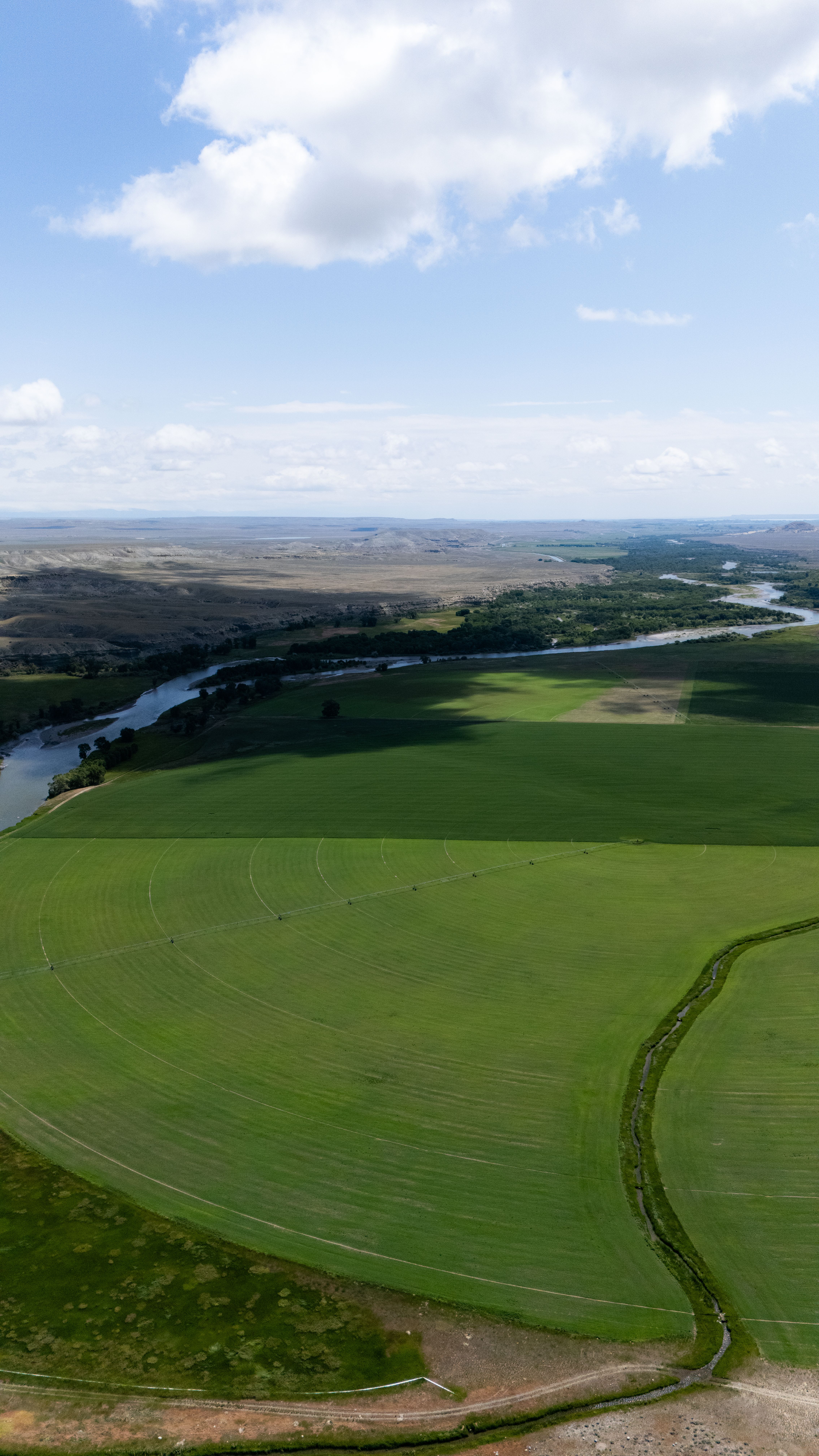 Aerial View of Scenic Farming Fields and River · Free Stock Photo