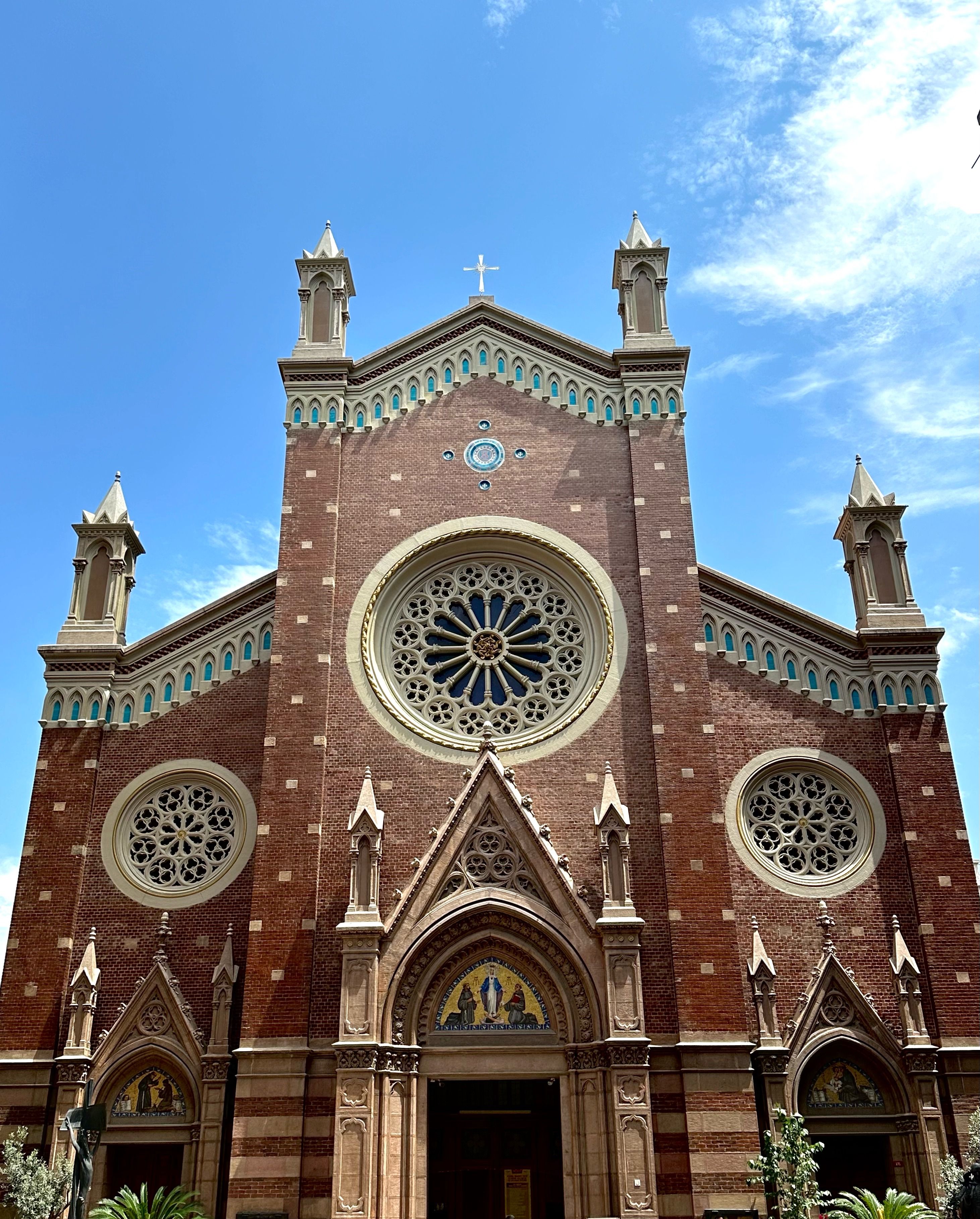 Stunning Gothic Church Facade with Rose Windows · Free Stock Photo
