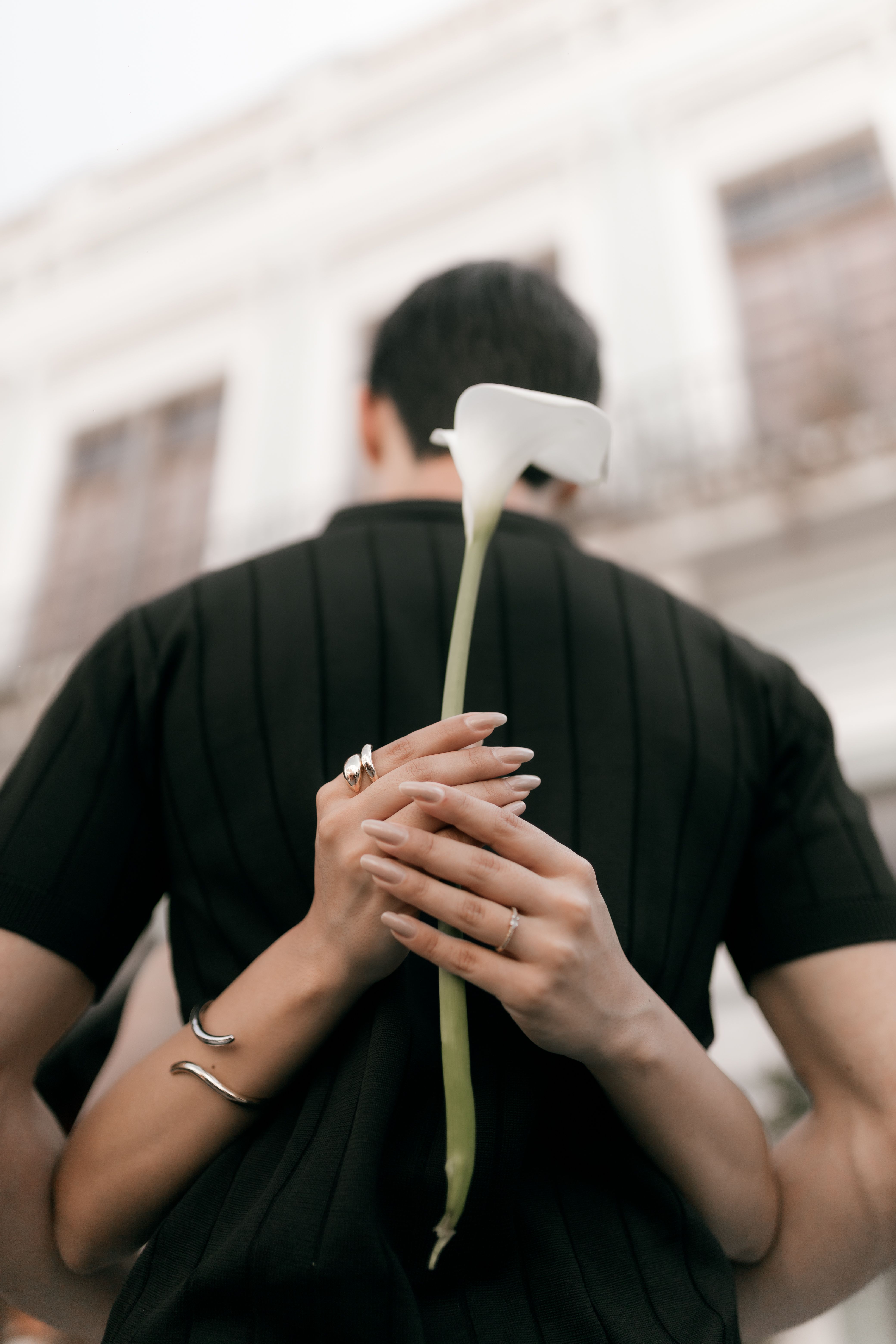 Embrace Behind with Calla Lily Wedding Pose · Free Stock Photo