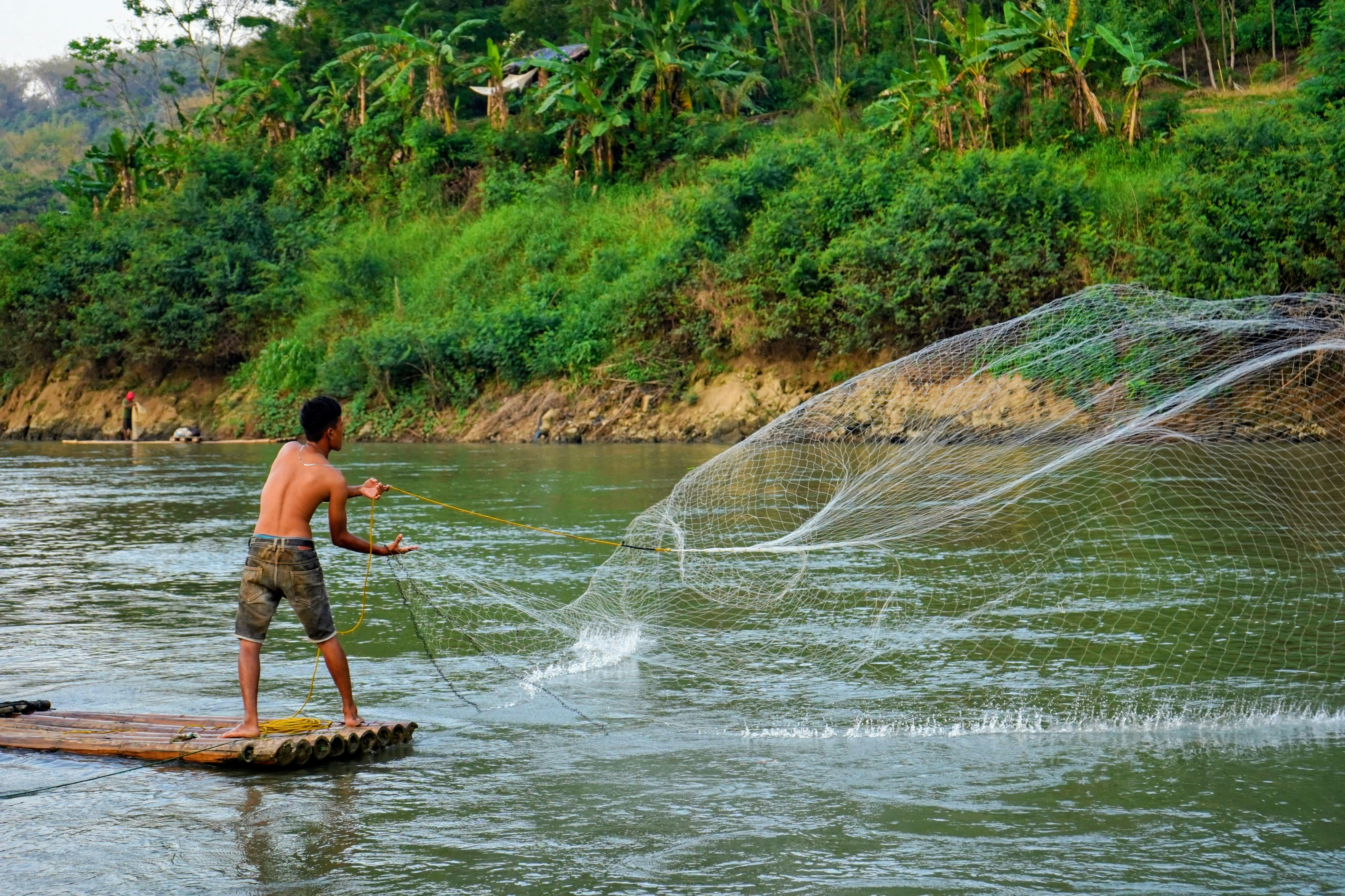 Traditional Fishing on River Raft in West Java · Free Stock Photo