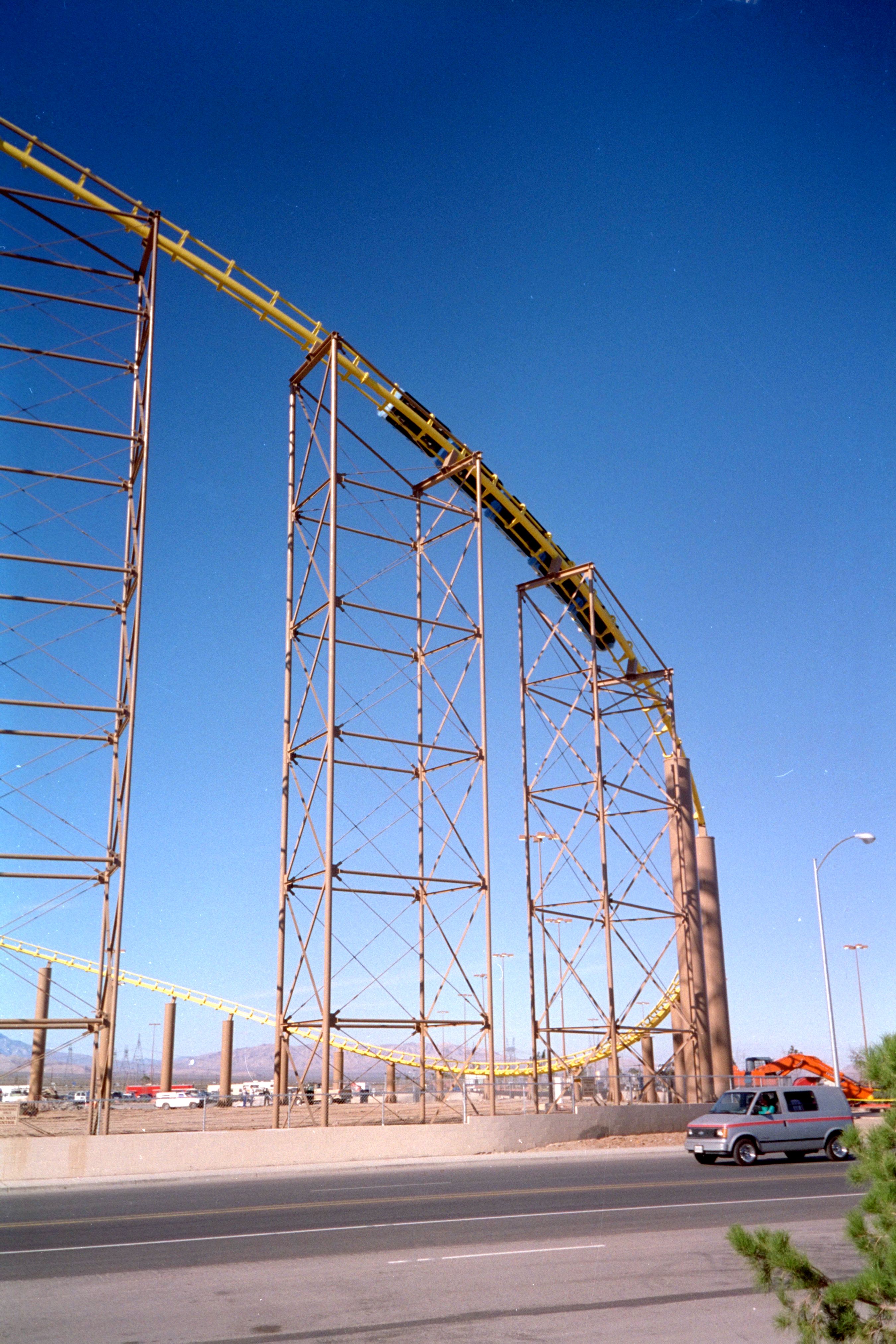 Tall Roller Coaster under Clear Blue Sky · Free Stock Photo